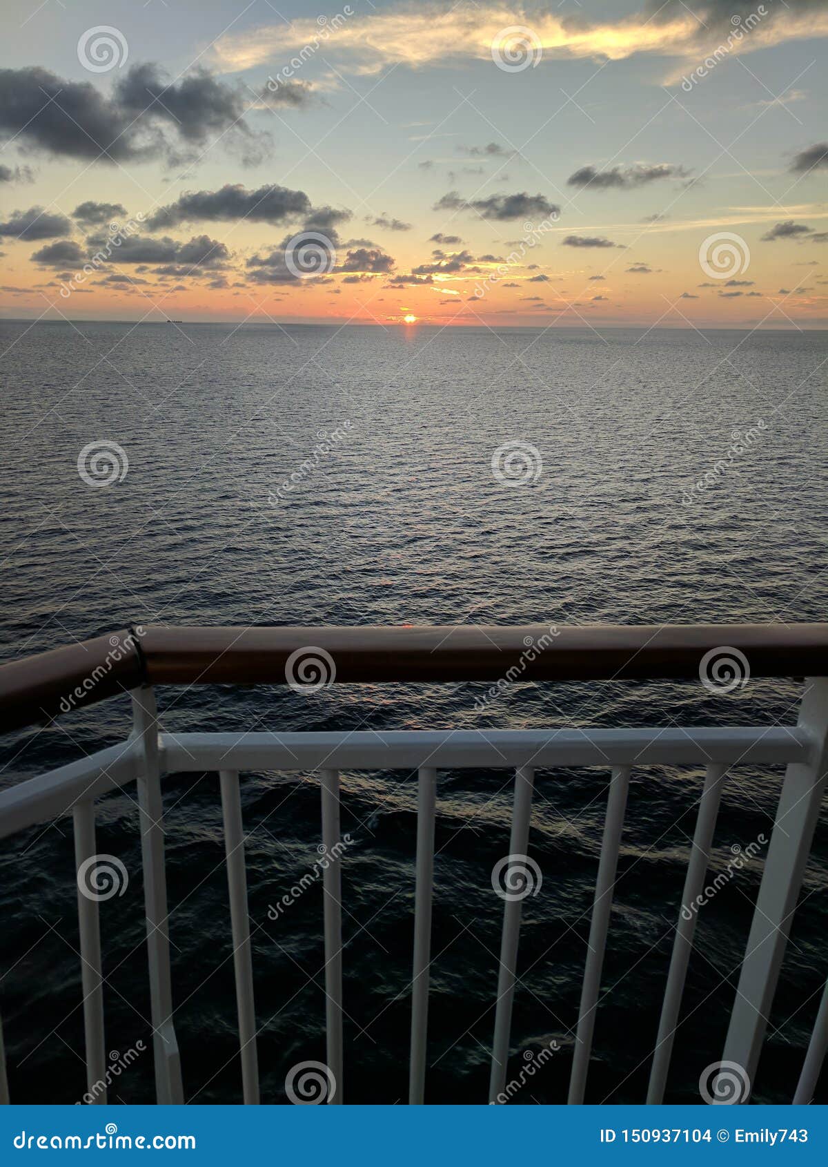 Sunset on the Ocean, with with Railing in Front Stock Photo - Image of ...