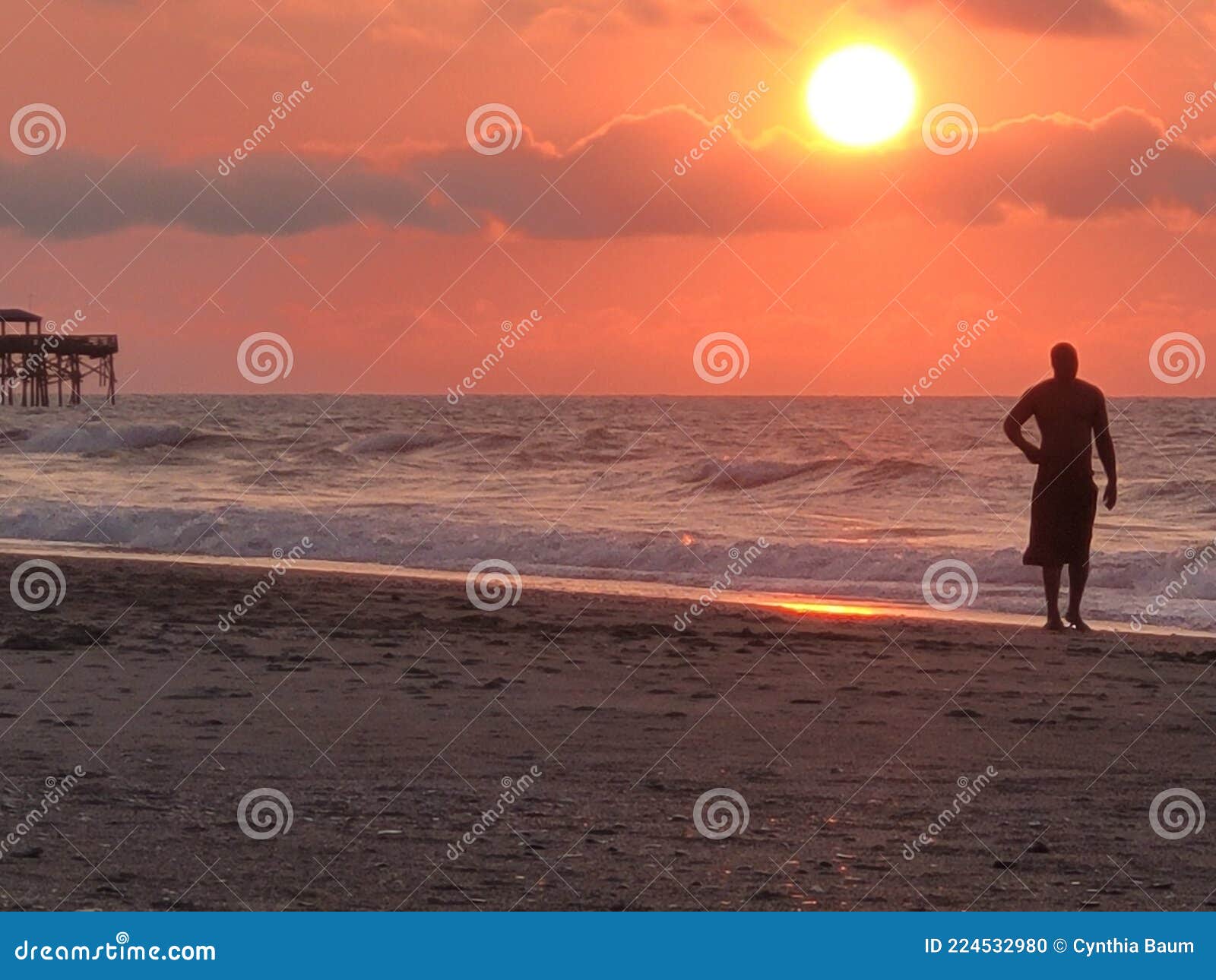 Sunset Ocean Teen on Beach stock photo. Image of sunset - 224532980