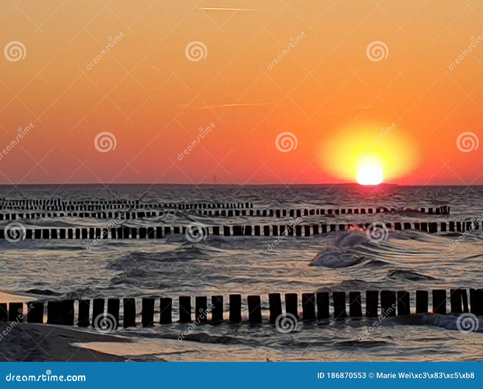 Sunset ocean water beach stock image. Image of afterglow - 186870553