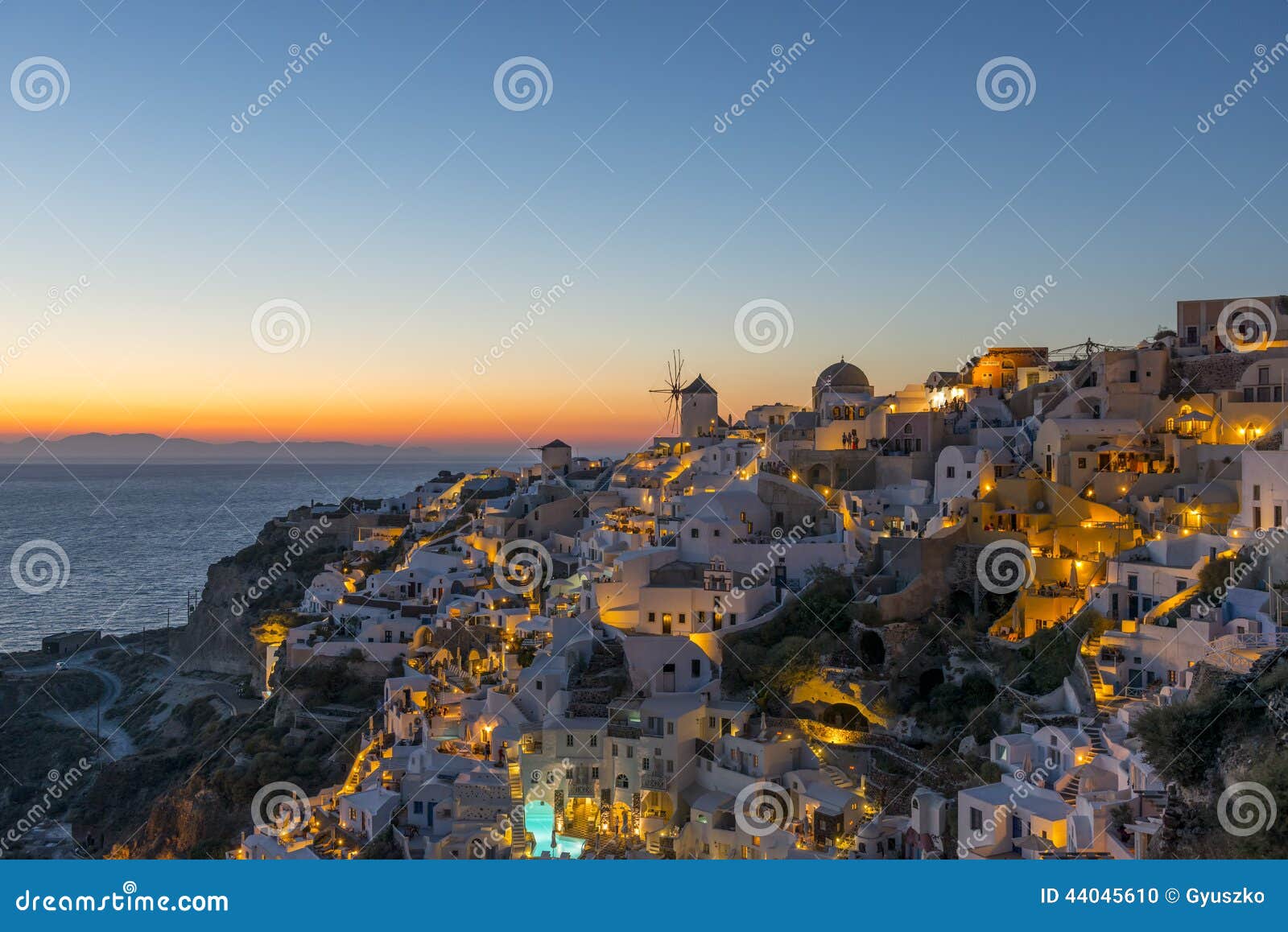 Sunset in Oia, Santorini stock photo. Image of dome, person - 44045610