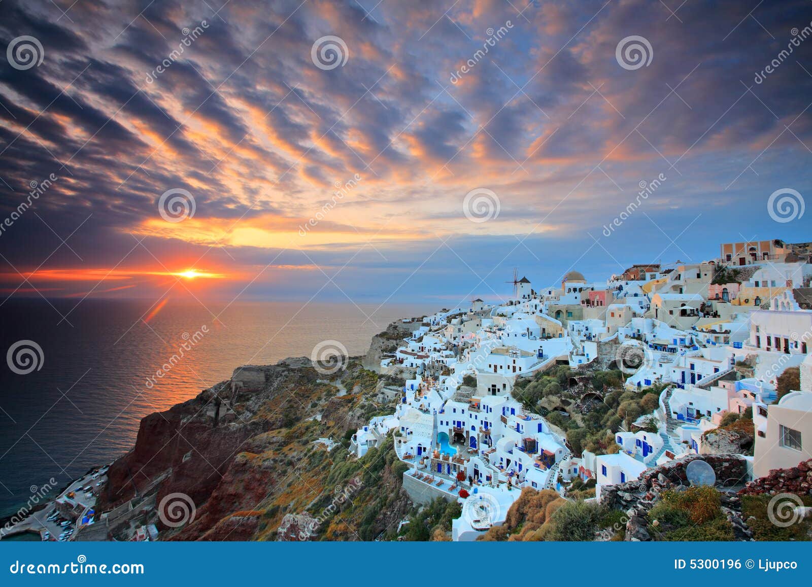 Sunset at Oia village stock photo. Image of holiday, island - 5300196
