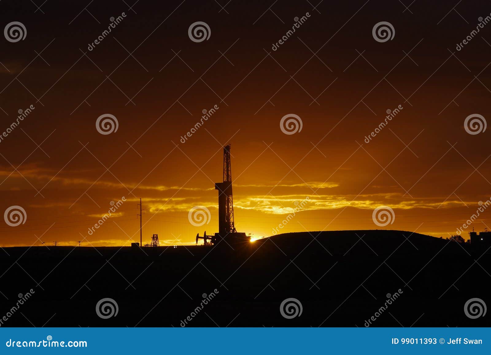 Sunset on an oil rig stock image. Image of dawn, landscape - 99011393