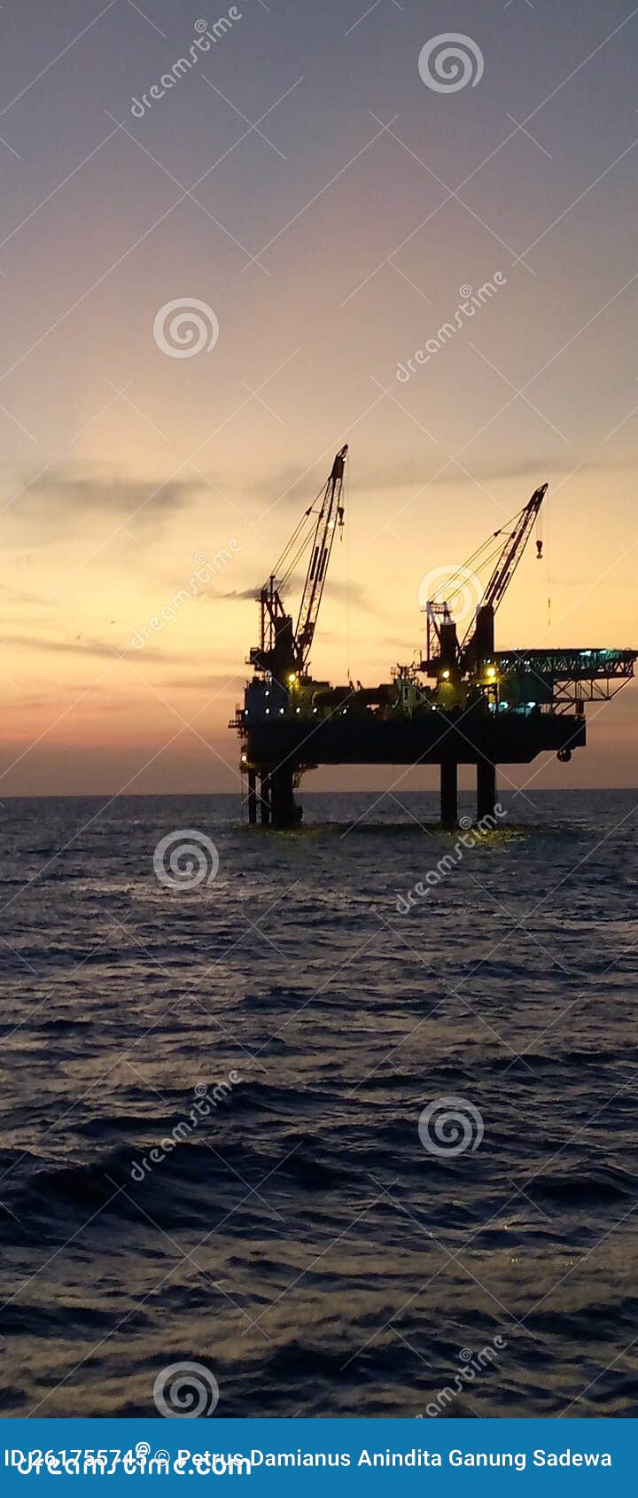 Sunset Oil Rigs stock image. Image of platform, rigs - 261755745