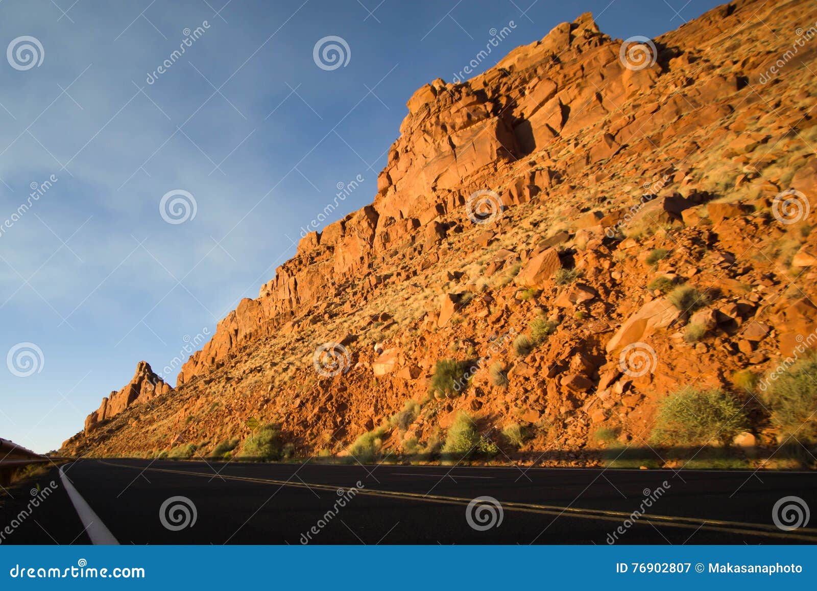 Sunset on the open road stock image. Image of mountains - 76902807