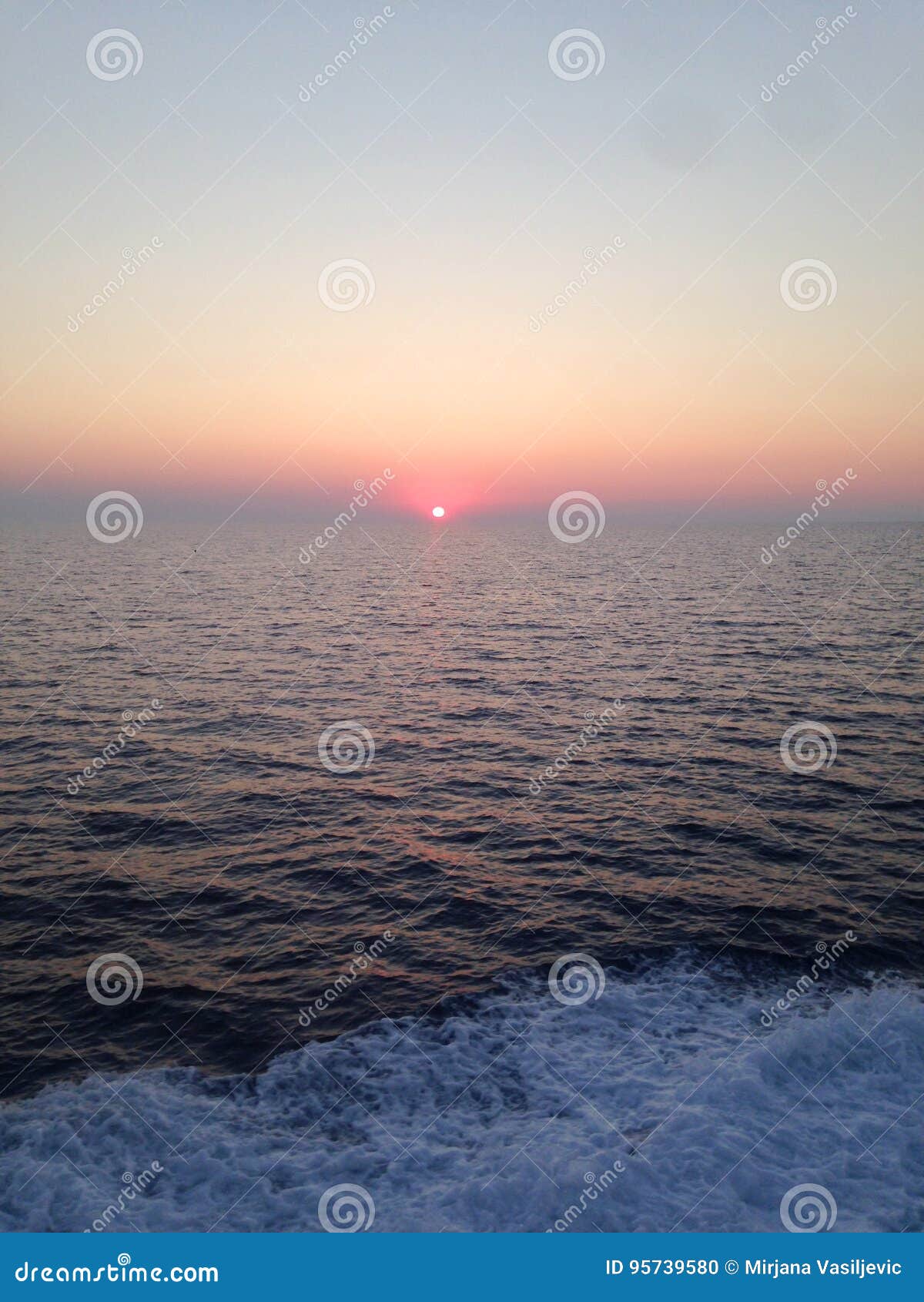 Sunset in the open sea stock photo. Image of evening - 95739580