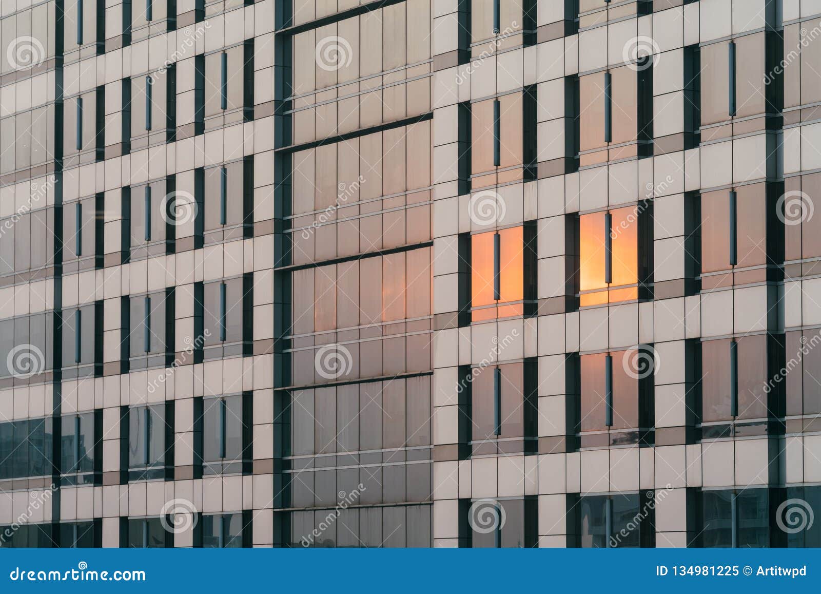 Sunset Orange Light Reflected on Glass and Cladding Facade in the ...
