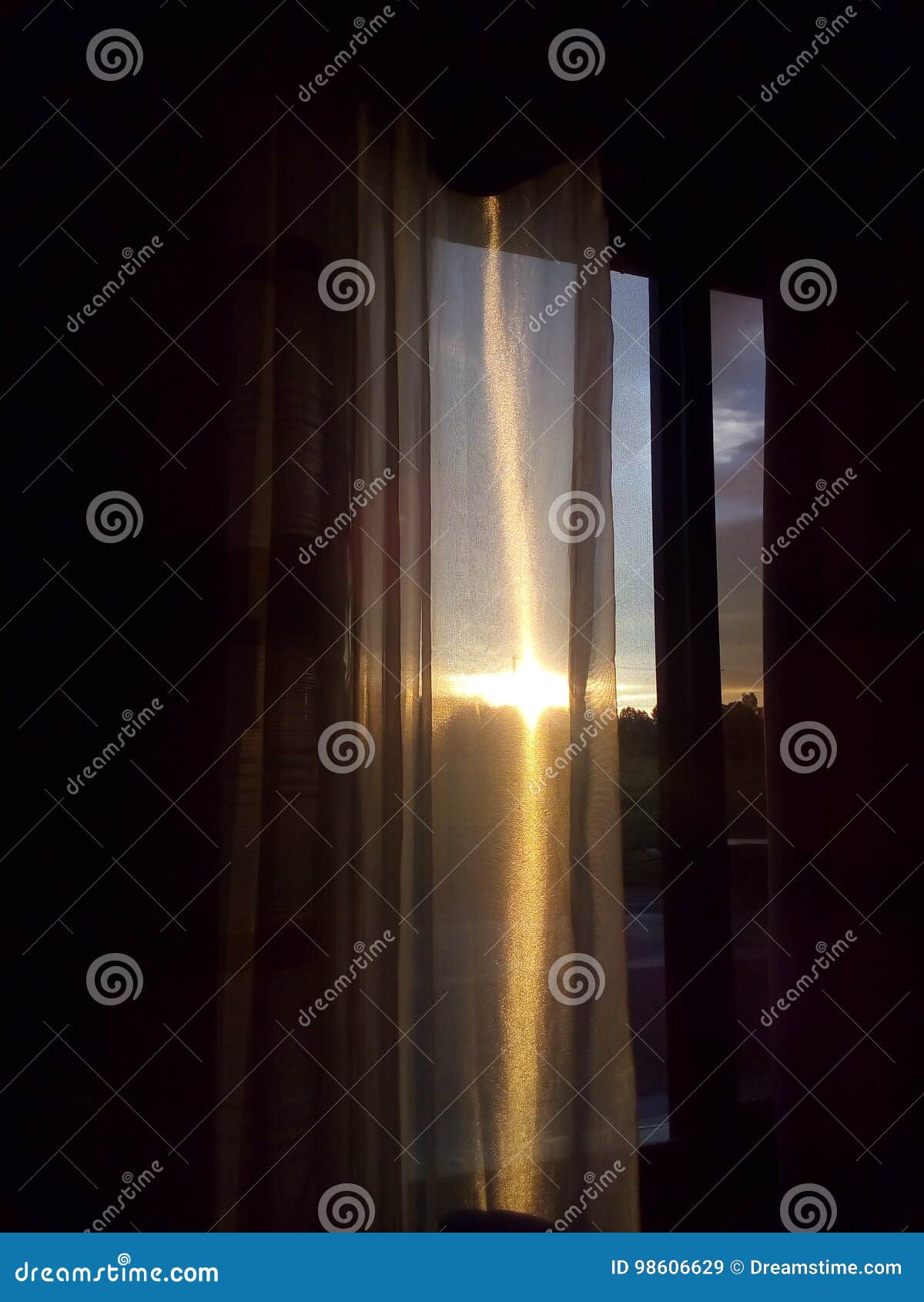 Sunset from our window stock image. Image of curtain - 98606629
