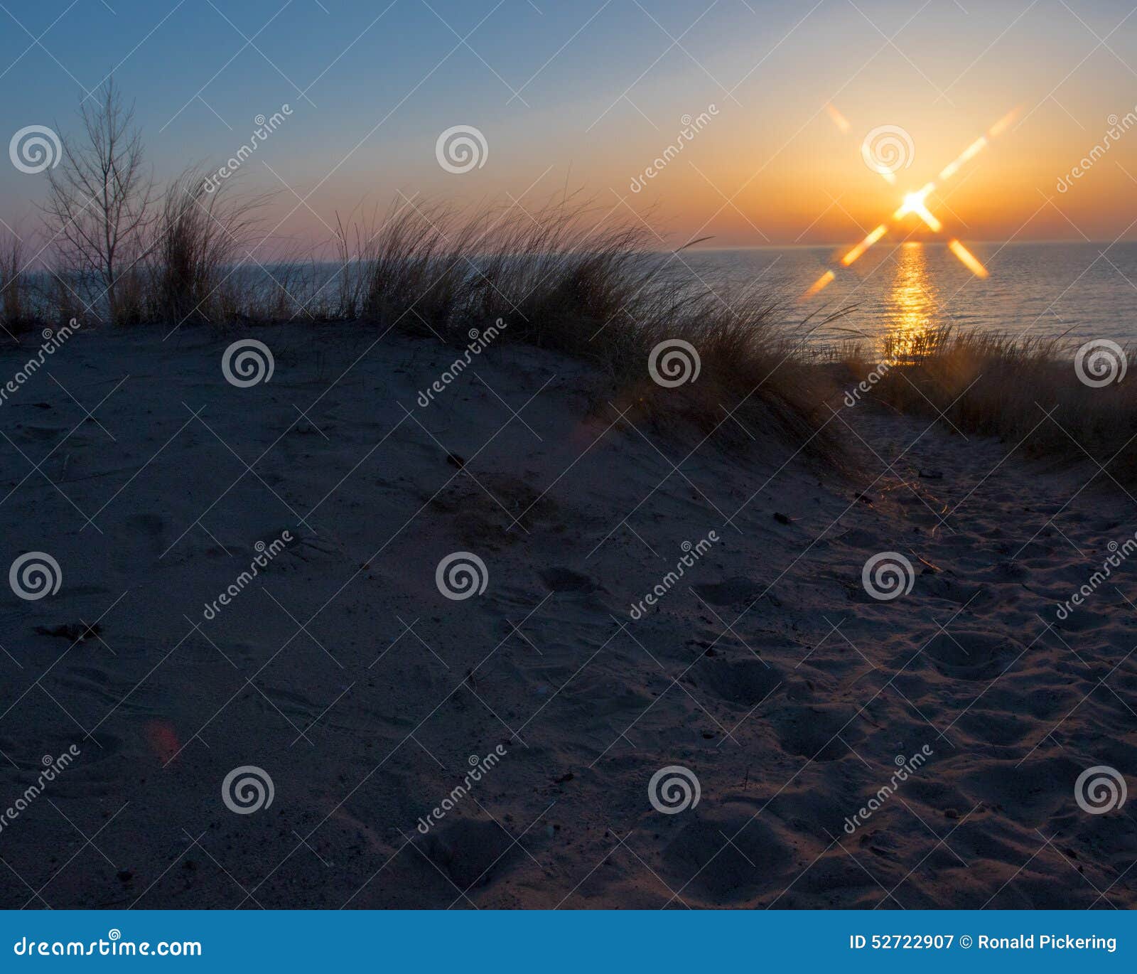 Sunset at Oval Beach Saugatuck Stock Image - Image of oval, spring ...