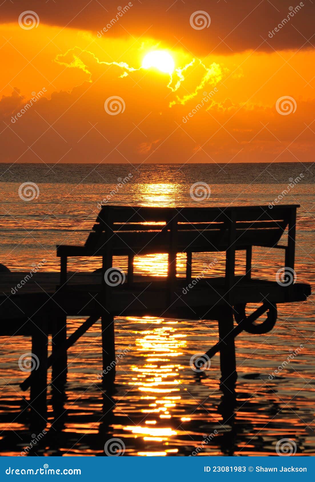 Sunset over bench on pier stock image. Image of structure - 23081983