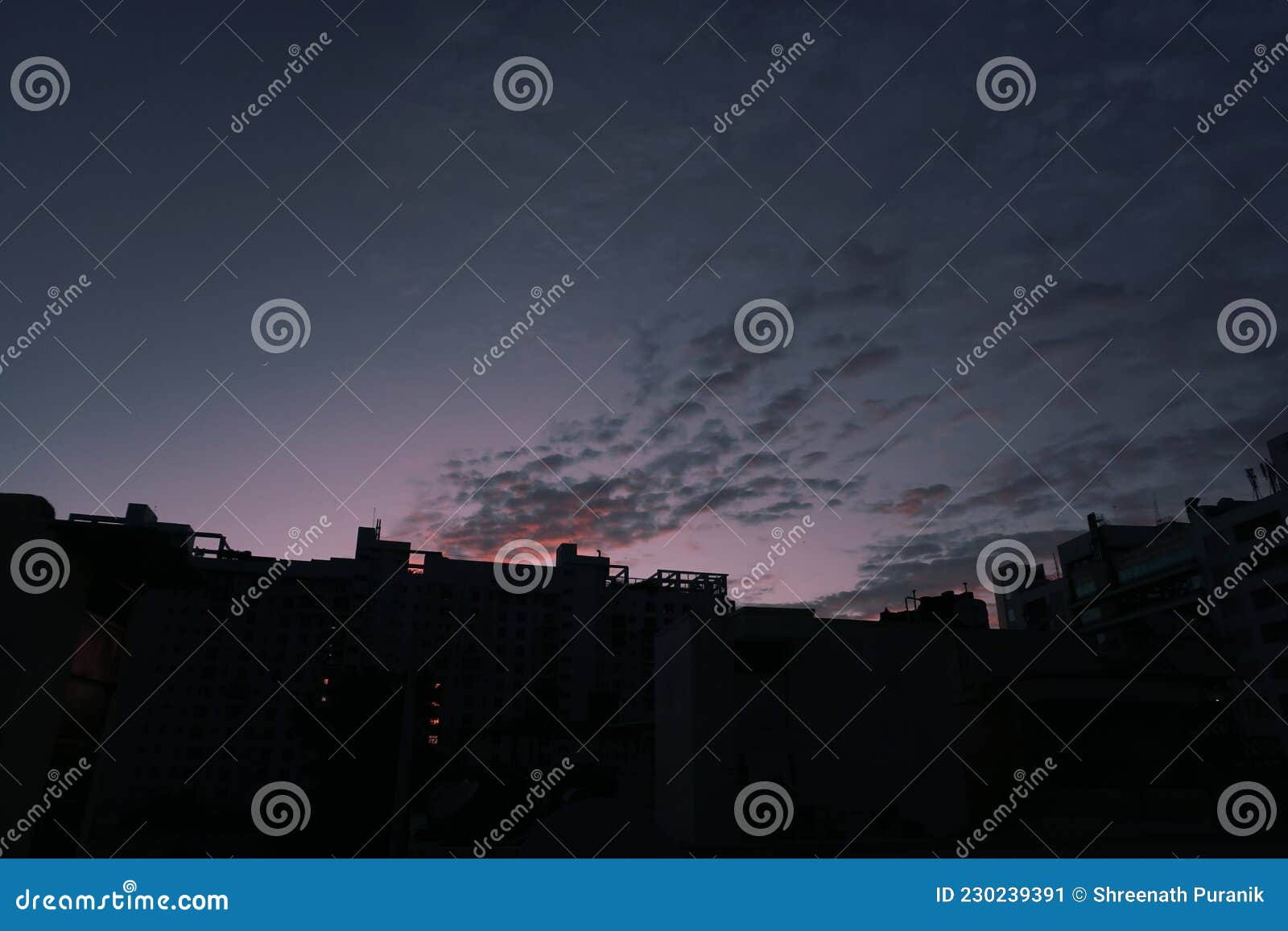 Sunset Over the Building of a City Stock Image - Image of dark, sunset ...