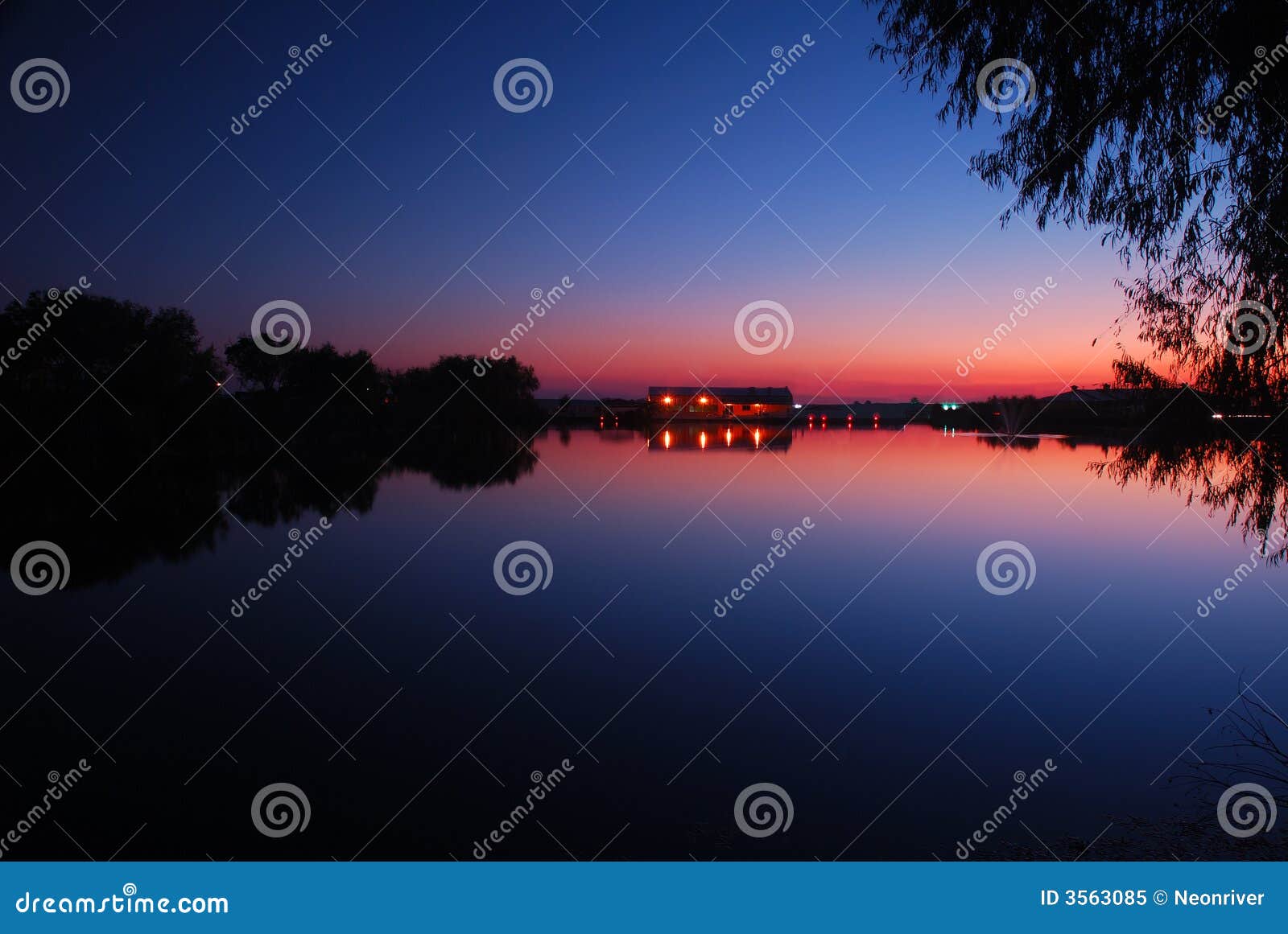 Sunset over calm lake stock image. Image of calm, scenery - 3563085