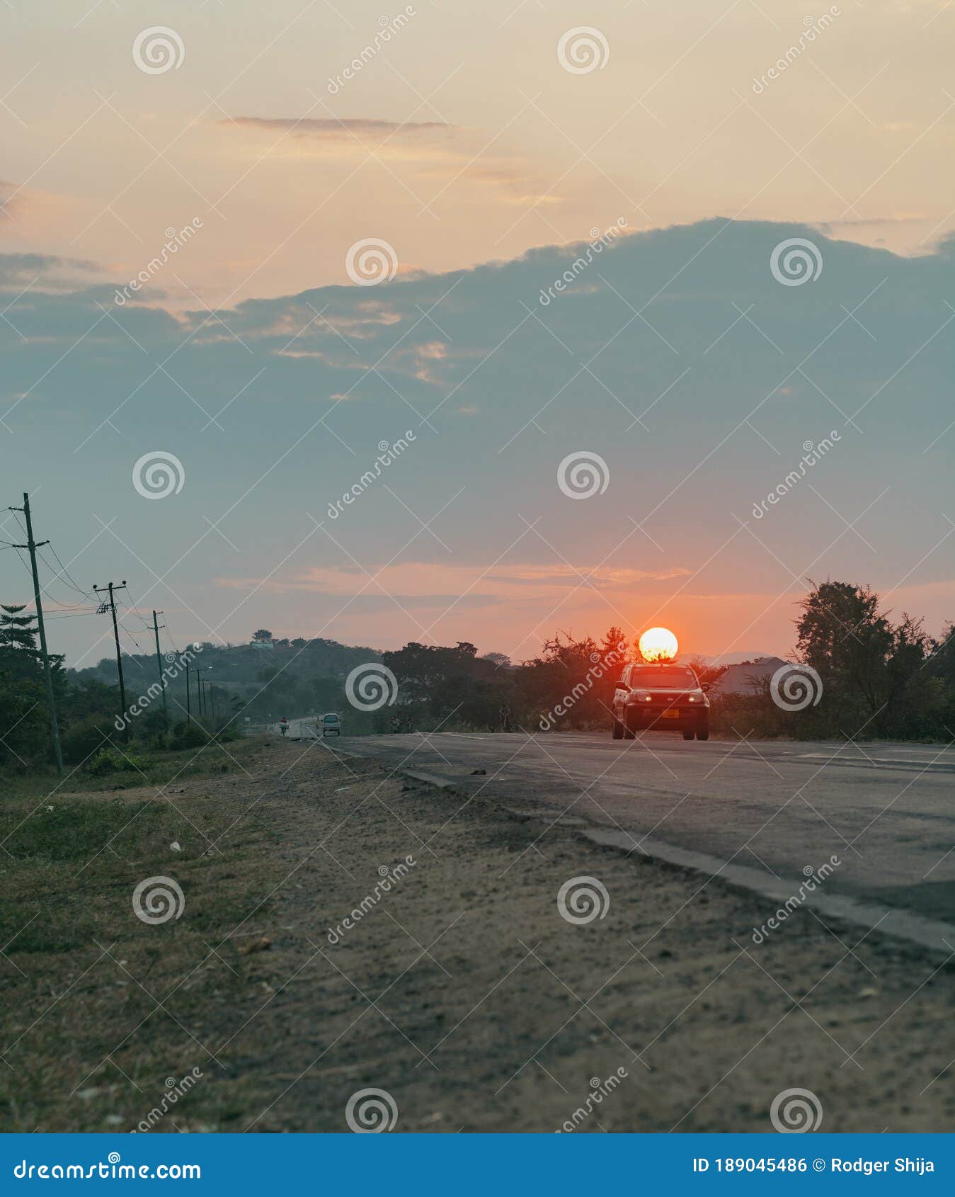 A sunset over a car editorial photo. Image of view, rural - 189045486
