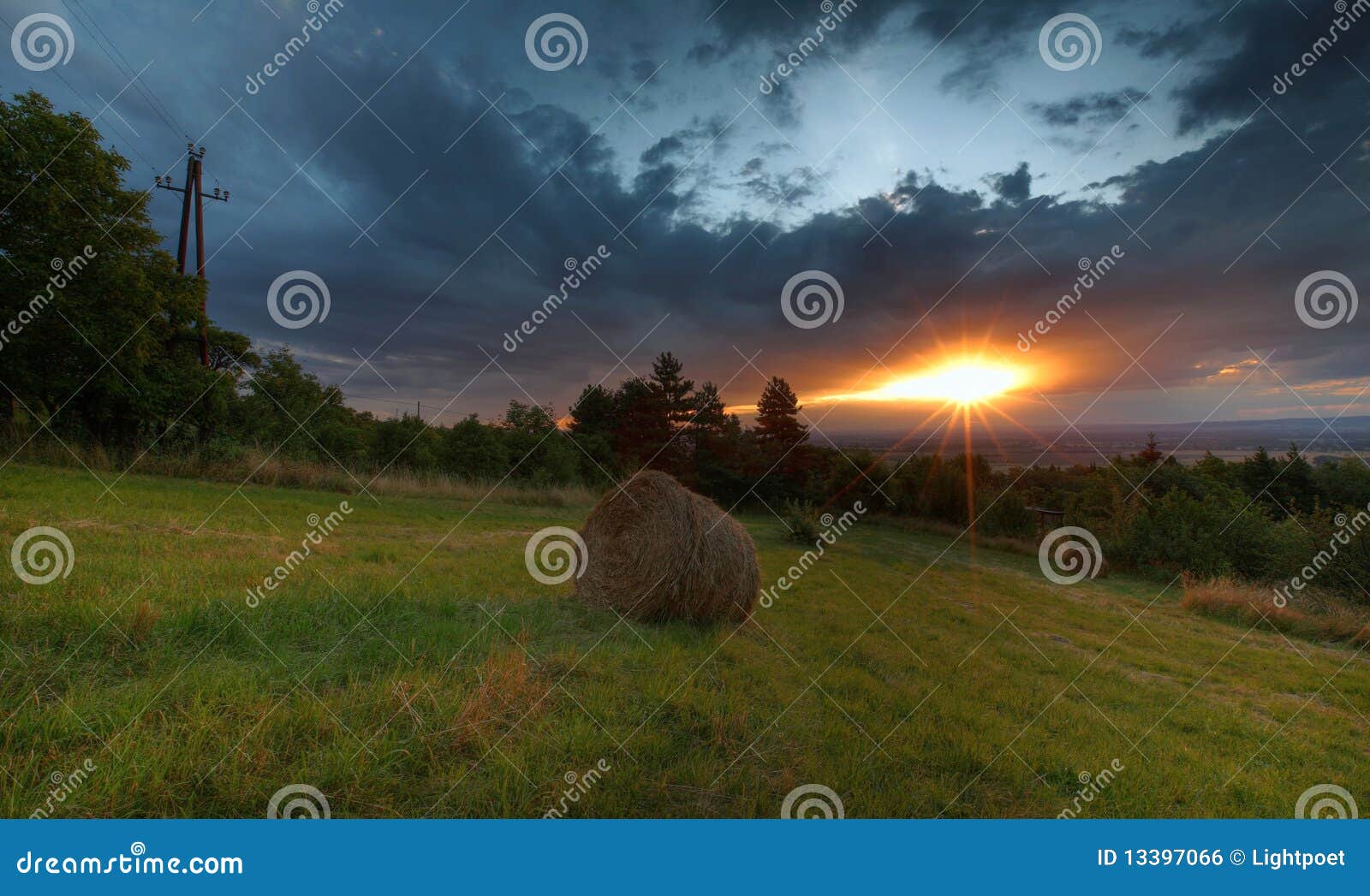Sunset Over Charming Countryside Stock Photo - Image of crop, landscape ...