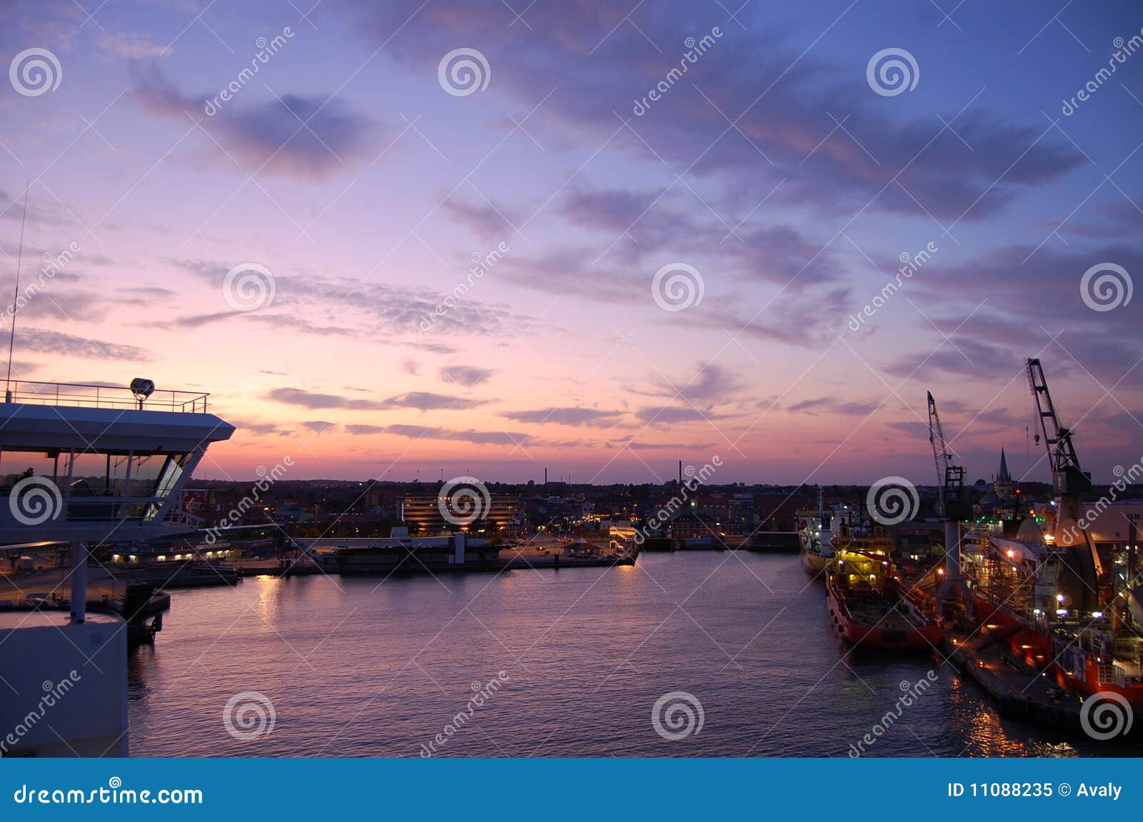 Sunset over city harbor stock image. Image of sunset - 11088235