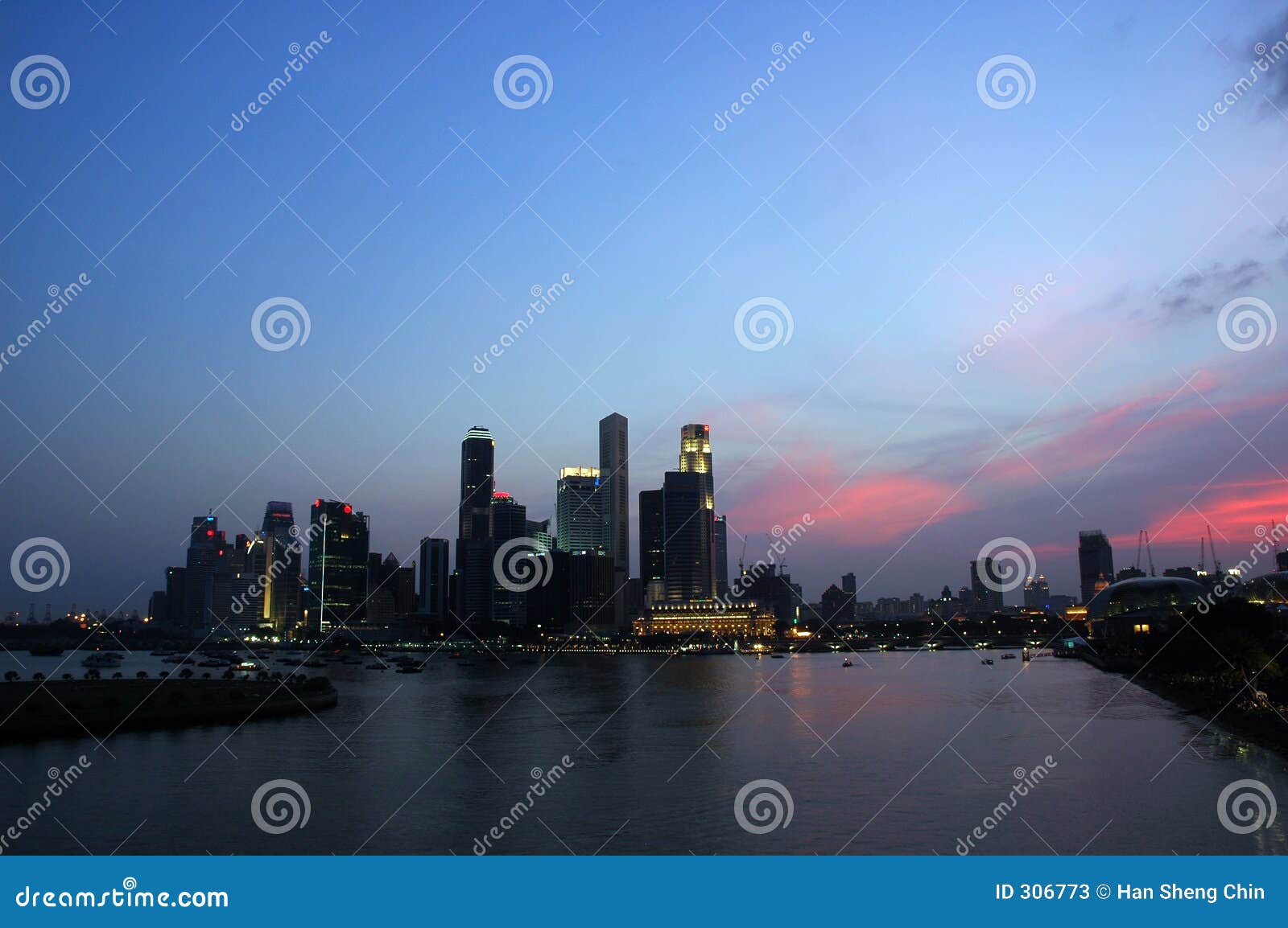 Sunset over city skyline stock image. Image of skyline - 306773