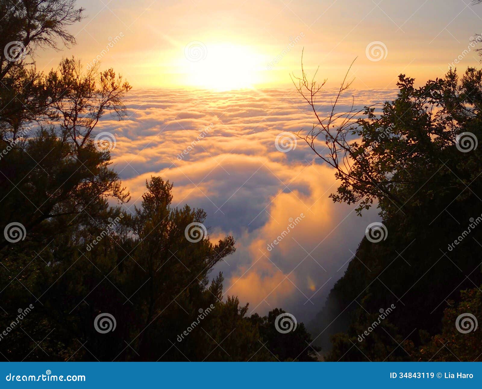 Sunset over clouds stock image. Image of color, sunrise - 34843119
