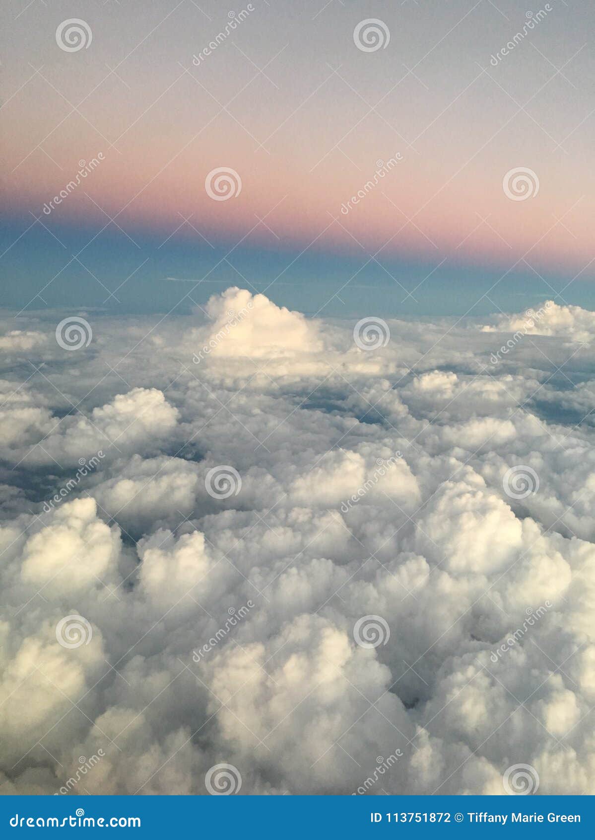 The sunset over the clouds stock photo. Image of sunset - 113751872