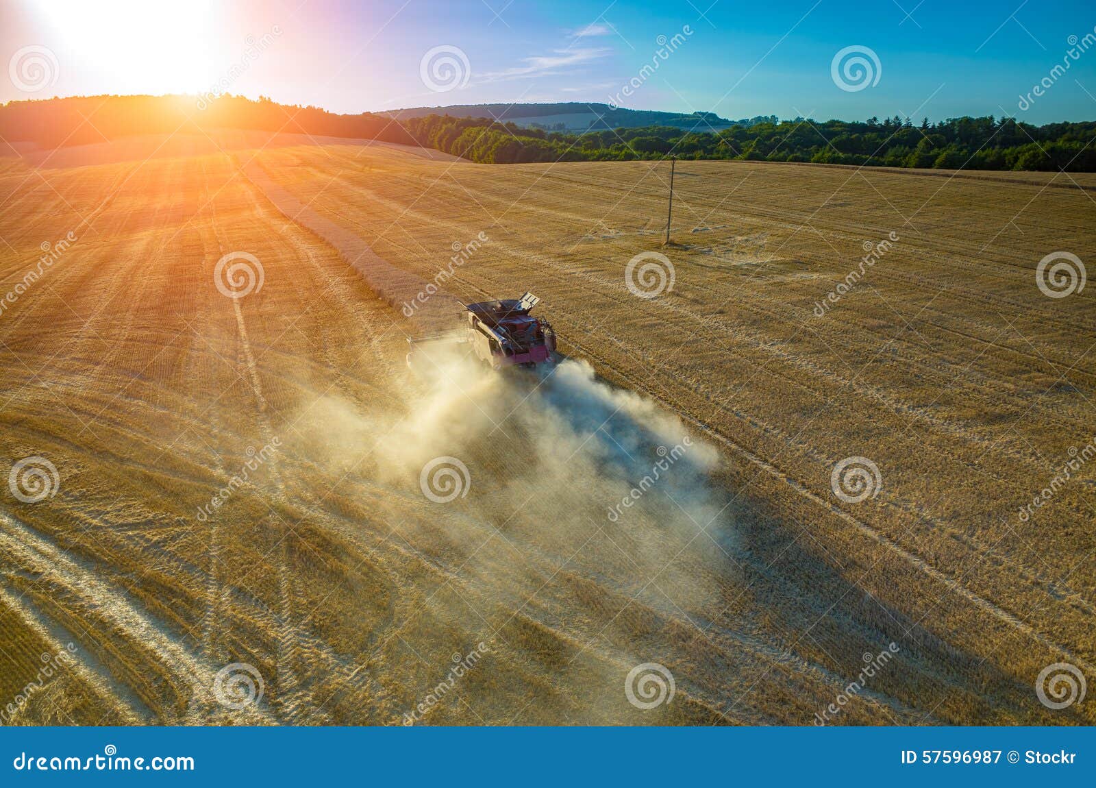 Sunset Over the Combine Working on the Field Stock Image - Image of ...