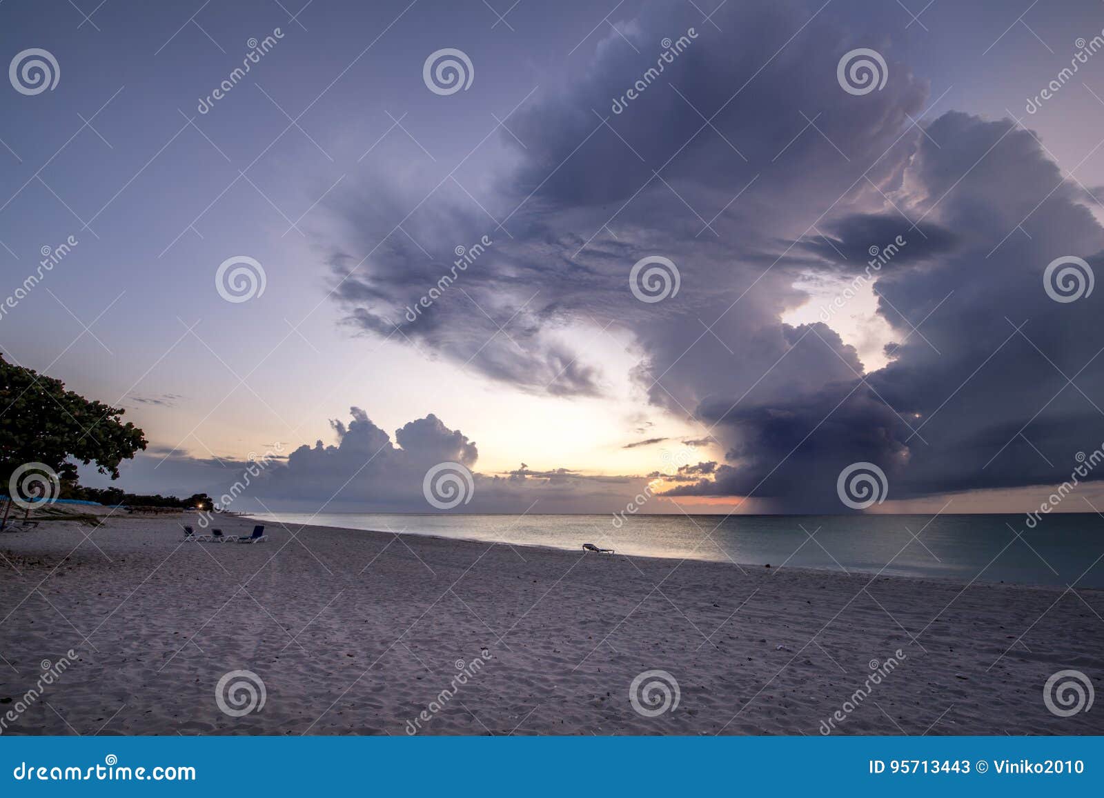 Sunset over Cuban beach stock image. Image of shore, cuba - 95713443