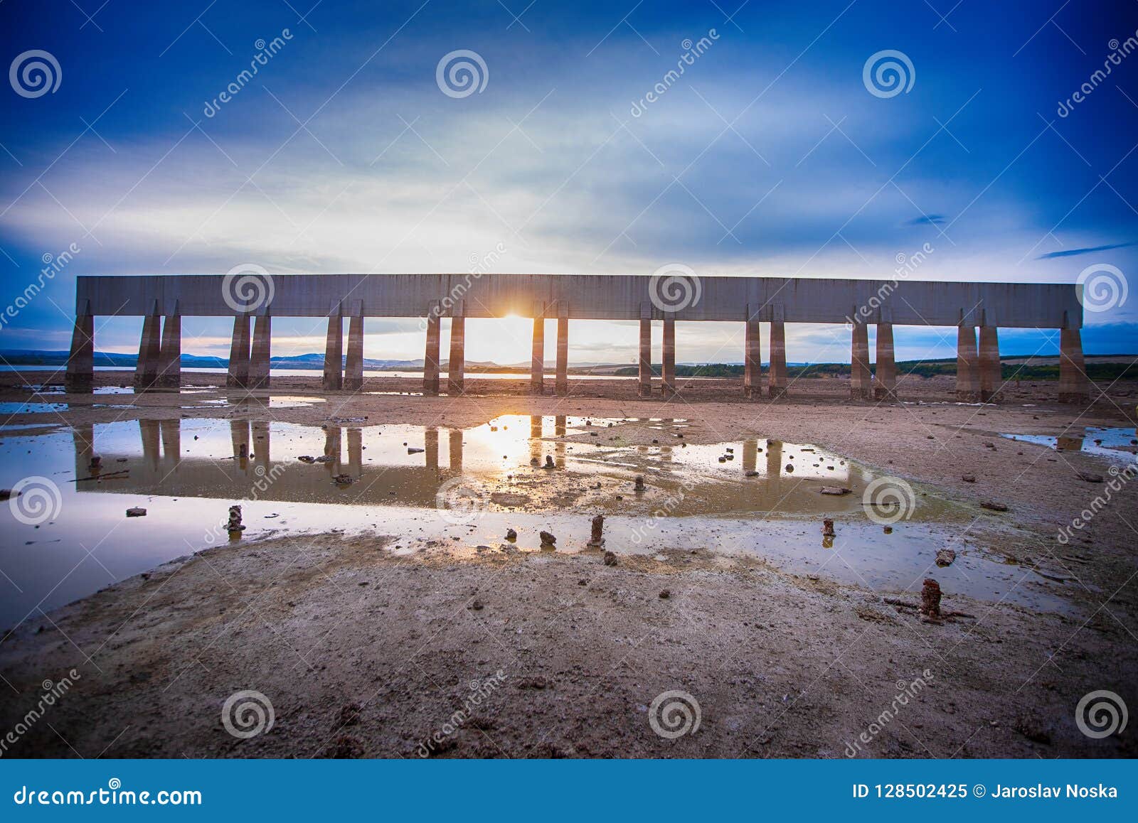 Sunset over the dam stock image. Image of beauty, beam - 128502425