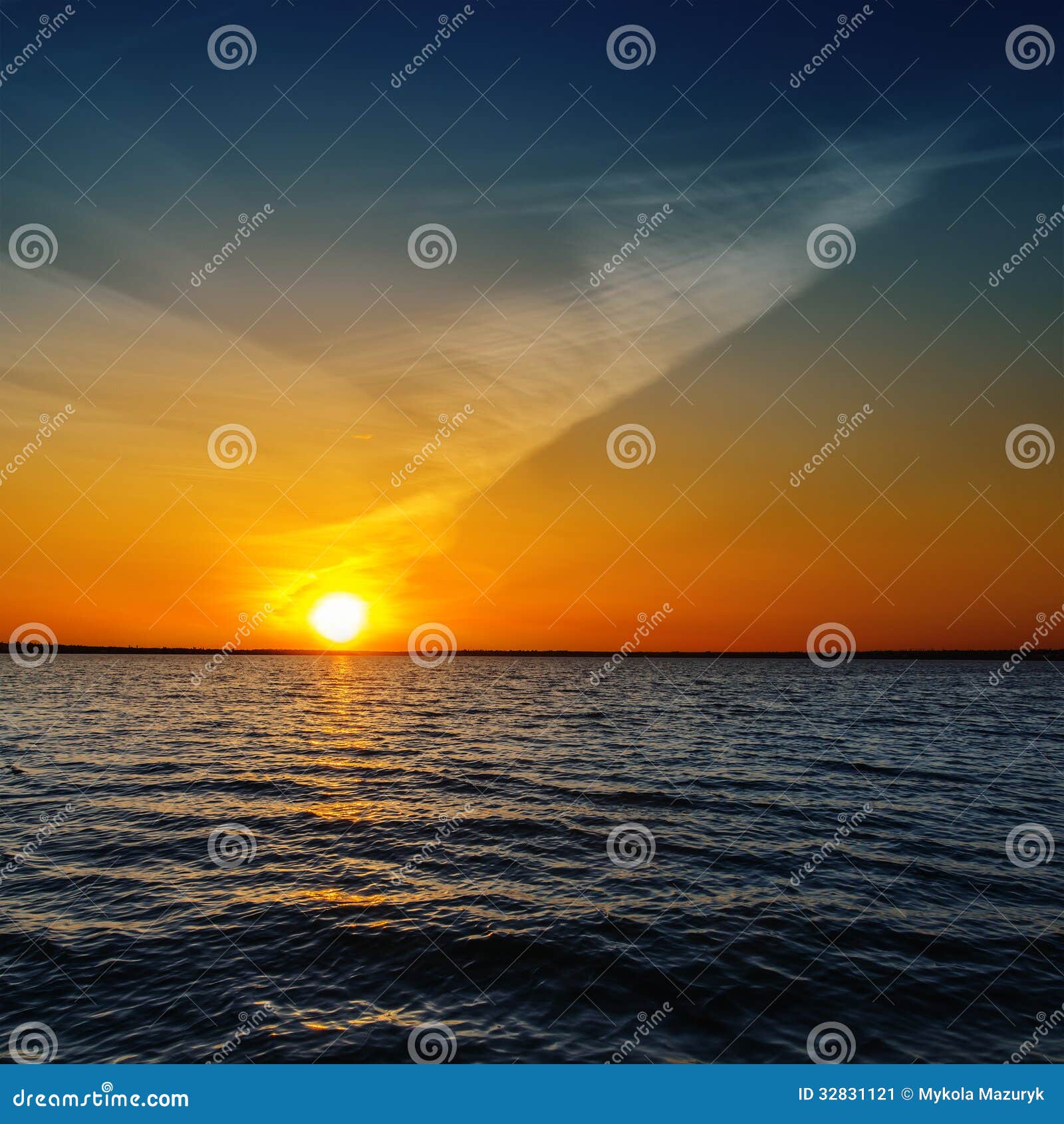 Sunset over dark water stock image. Image of skyline - 32831121