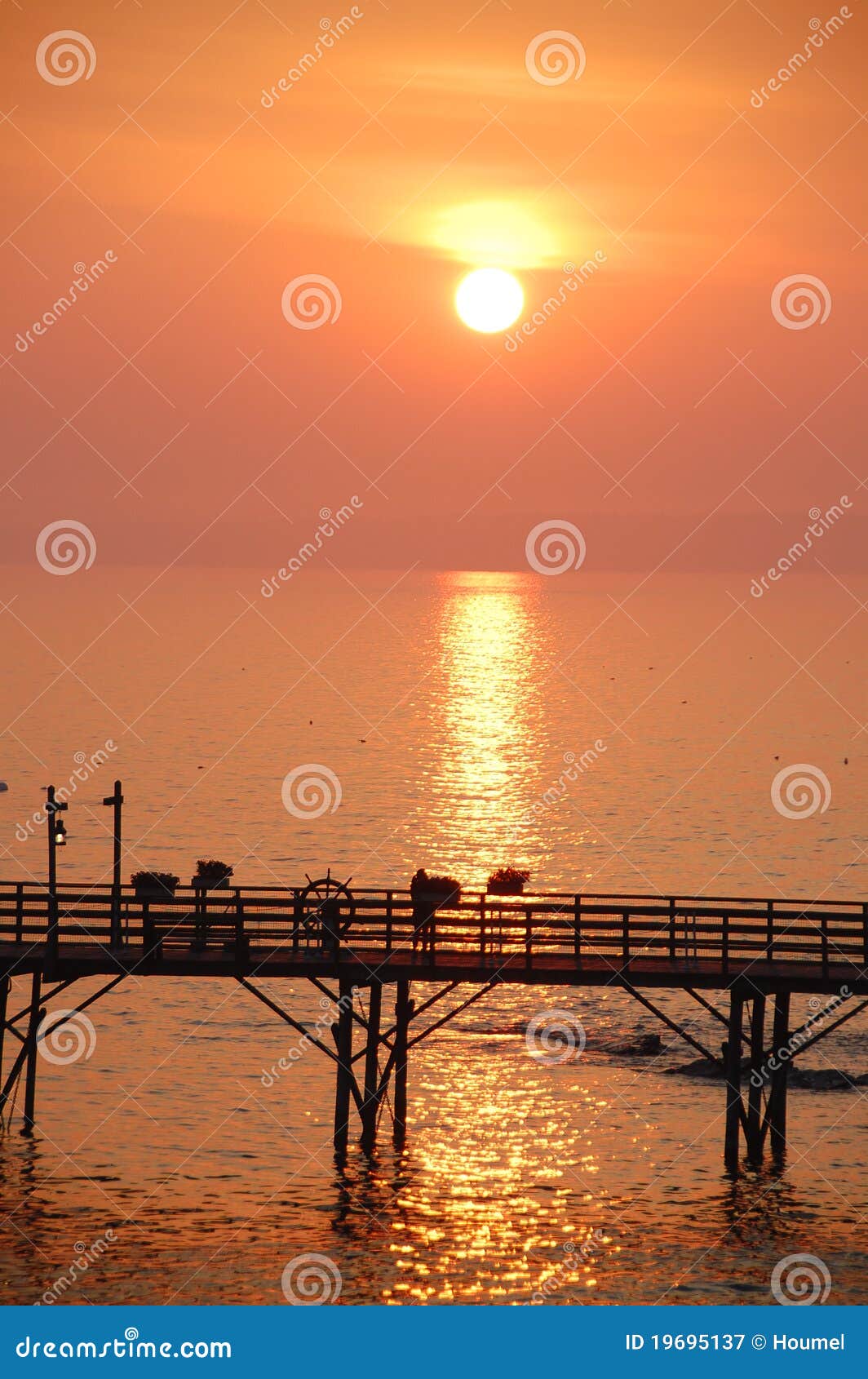 Sunset over dock stock image. Image of waves, sunset - 19695137