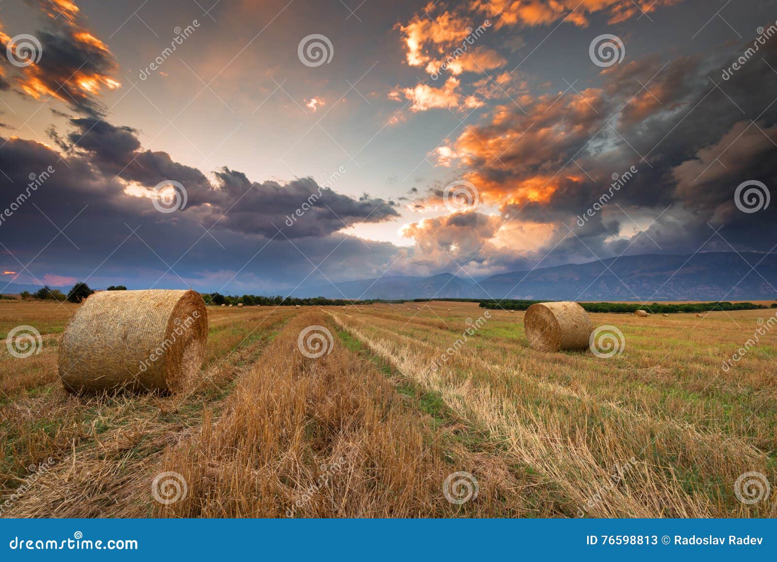 Sunset over farm field. stock image. Image of cricket - 76598813