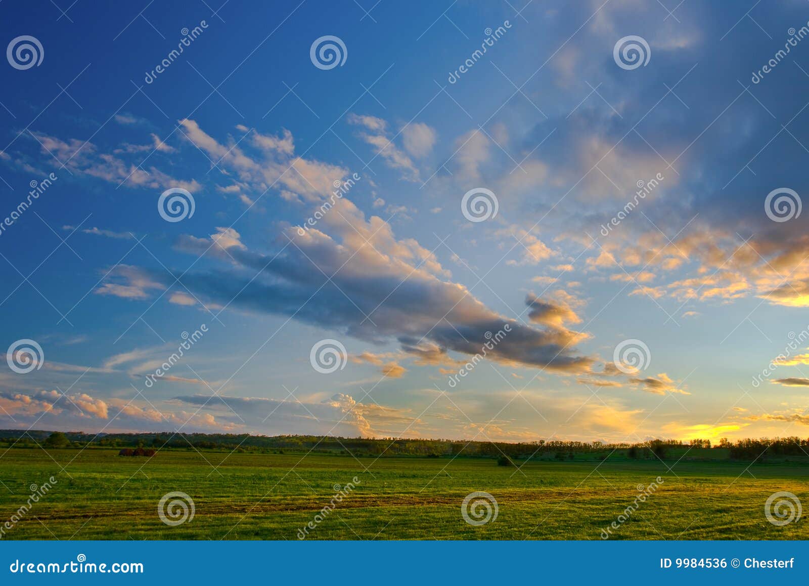 Sunset over the field stock photo. Image of plain, beautiful - 9984536