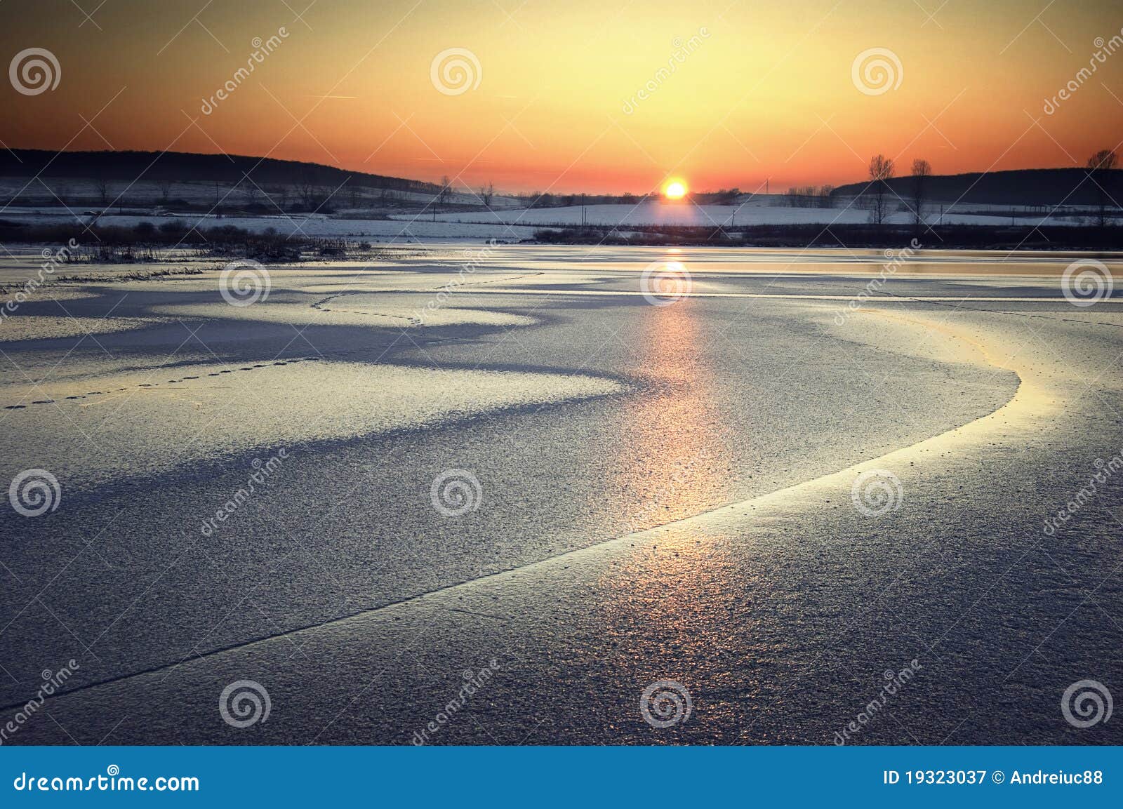 Sunset Over a Frozen Lake at Sunset Stock Image - Image of morning ...