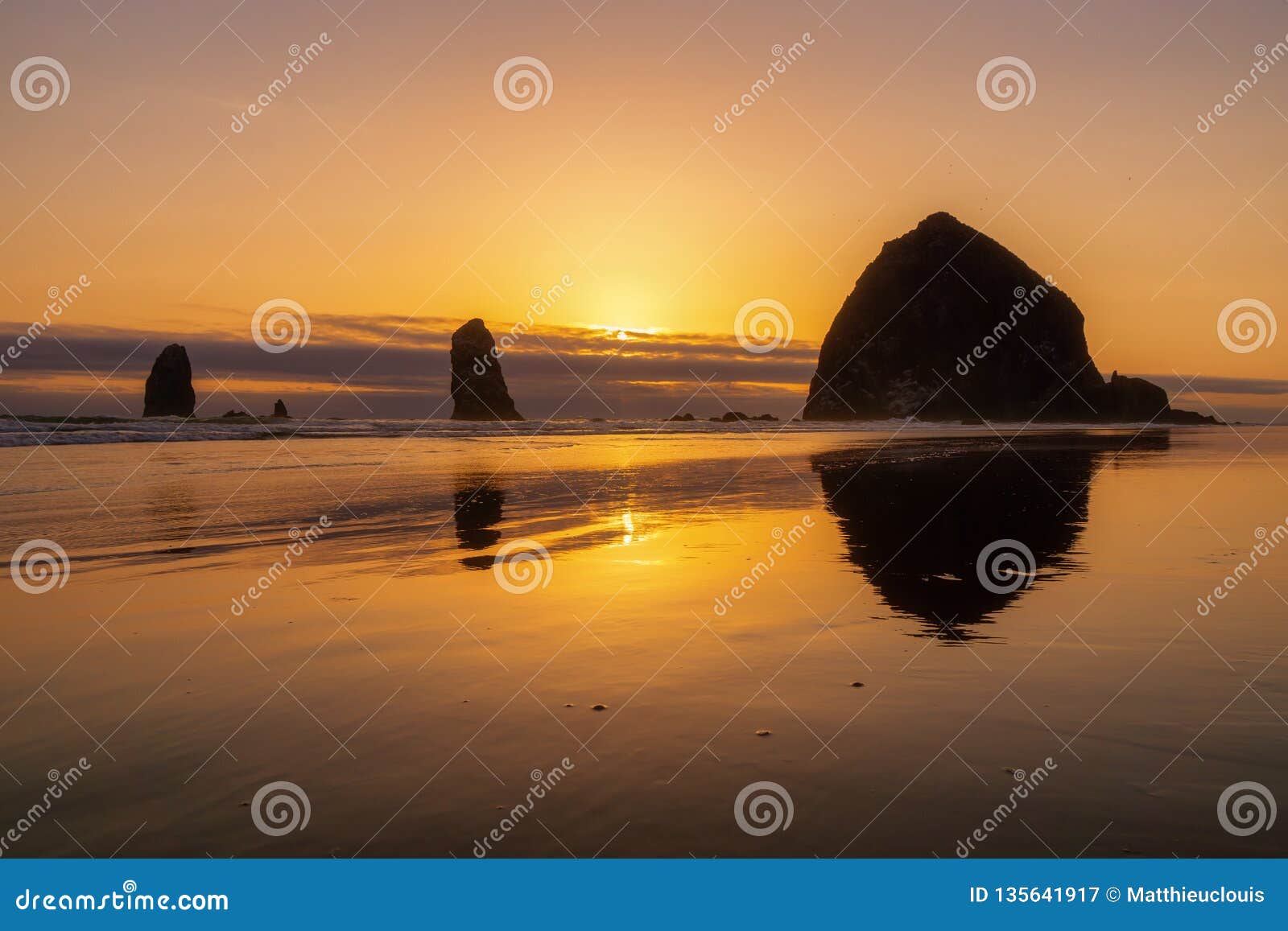 Sunset Over the Haystack Rock Stock Image - Image of scenery, geology ...