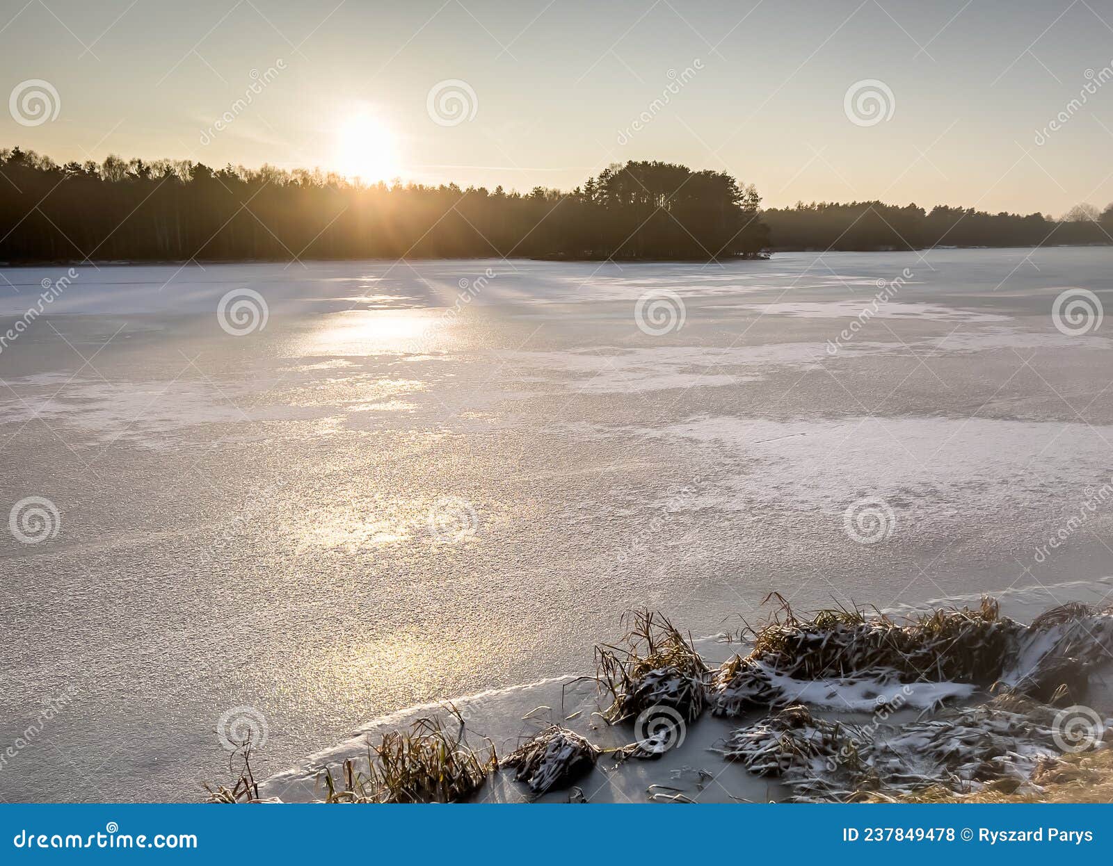 Sunset Over the Ice-covered Surface of the Lake Stock Photo - Image of ...