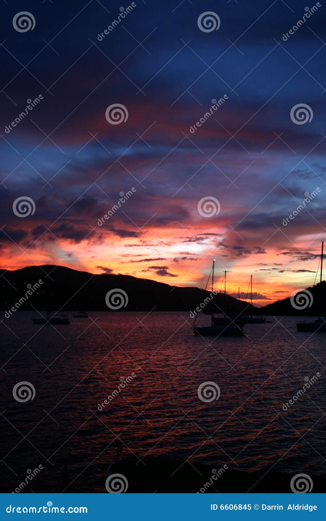 Sunset over island stock image. Image of rock, colourful - 6606845