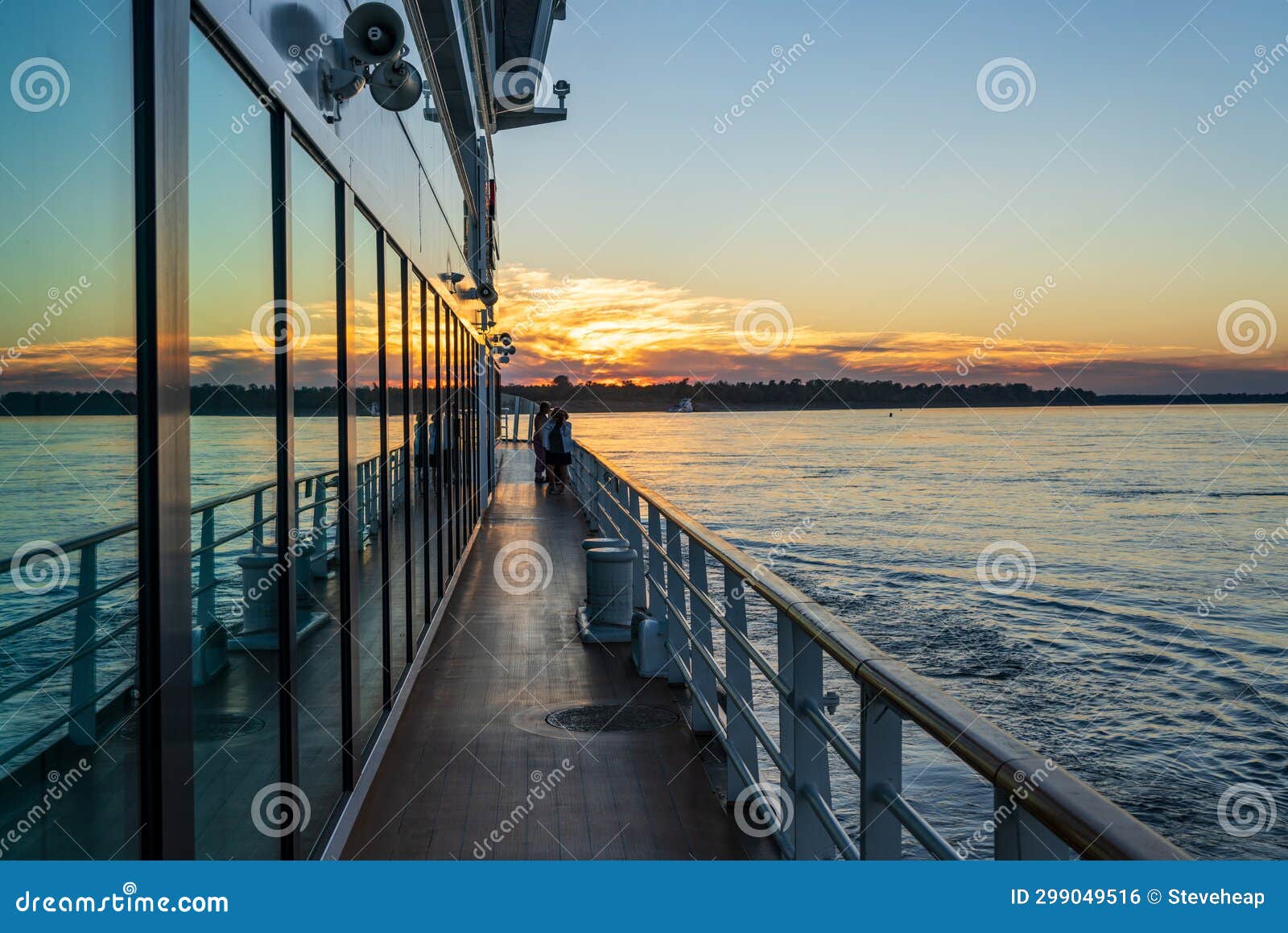 Dramatic Sunset Reflected in Windows of Mississippi River Cruise Boat ...