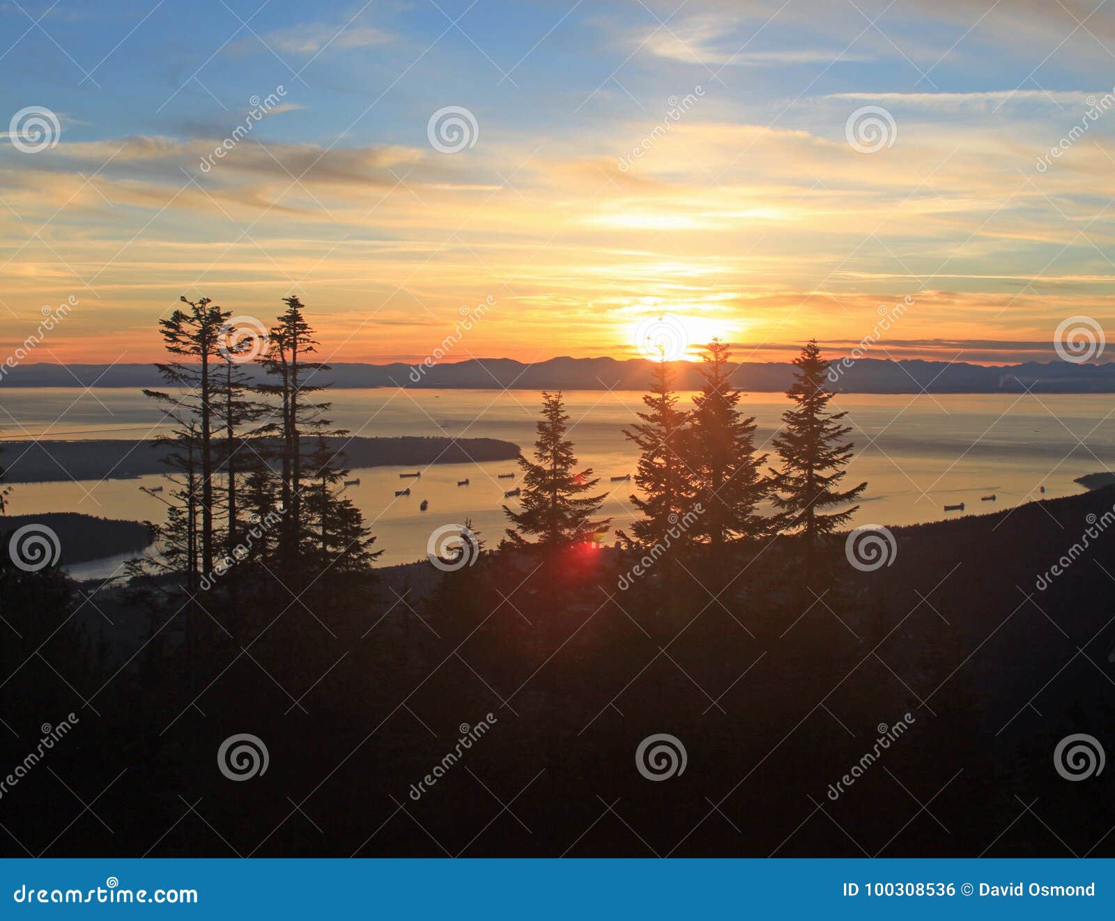 Sunset over the mountains stock photo. Image of beautiful - 100308536