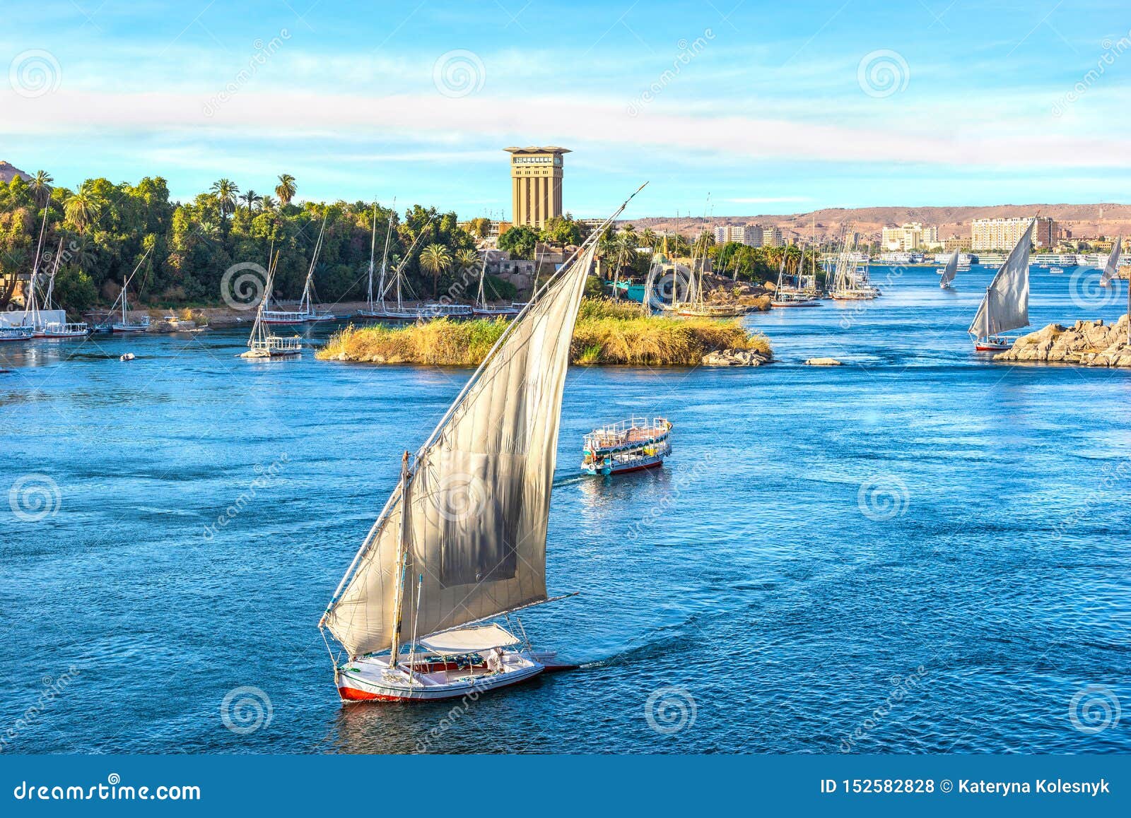 Sunset over Nile in Aswan stock photo. Image of feluka - 152582828
