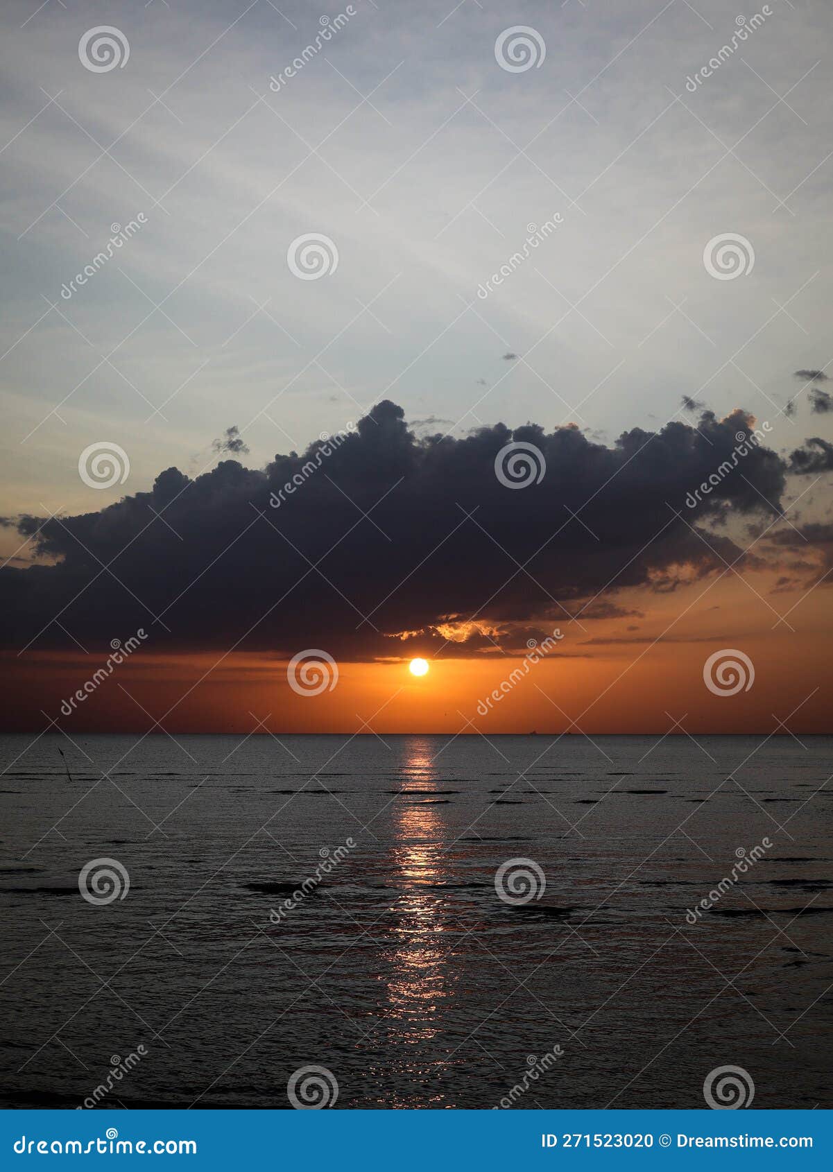 Sunset Over the Ocean with Rain Cloud Stock Photo - Image of sunlight ...