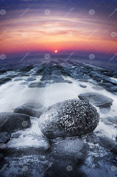 Sunset over Ocean Rocks stock photo. Image of reflection - 15728120