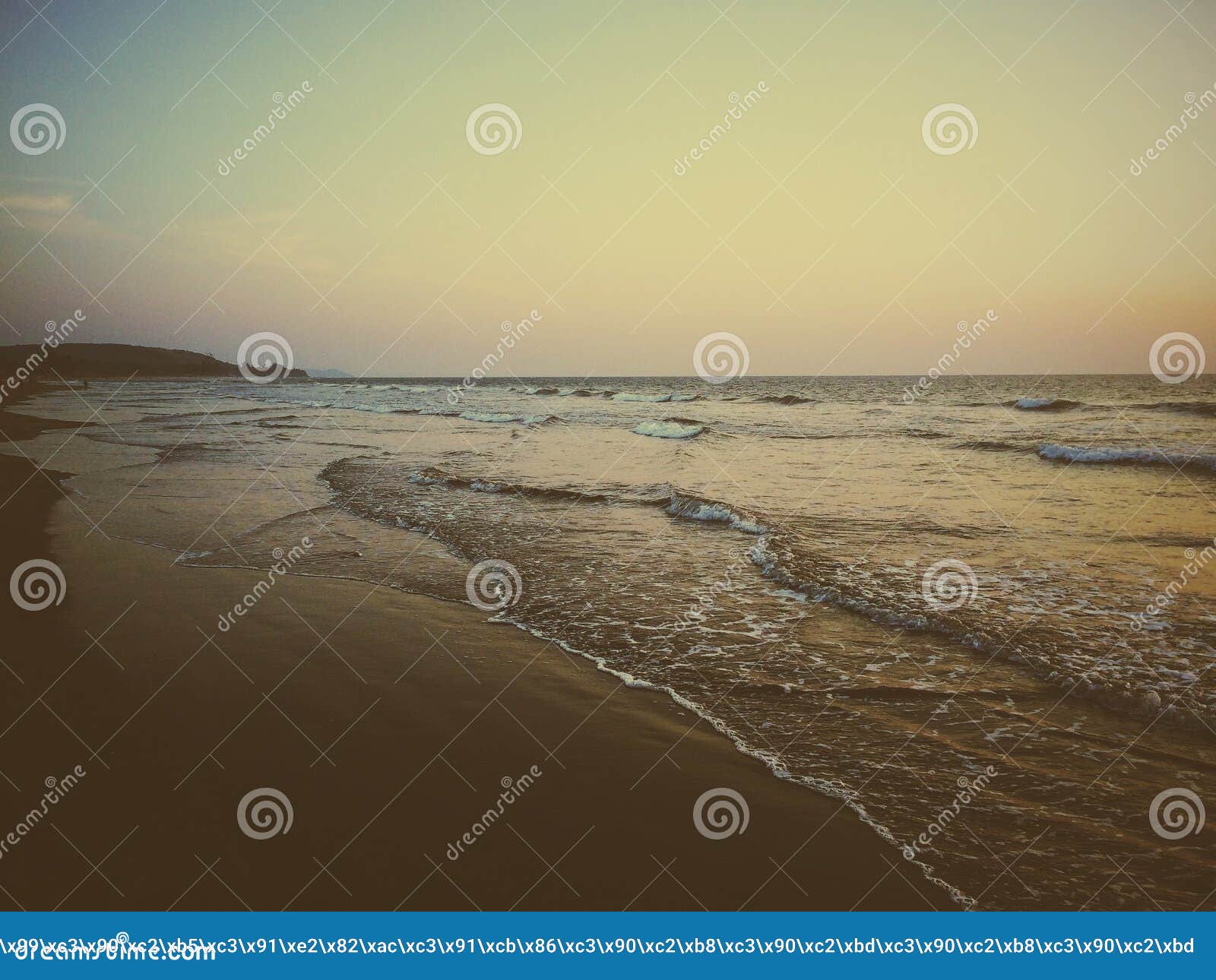 Sunset Over the Ocean. Sand Beach is Painted in Bright Colors in the ...