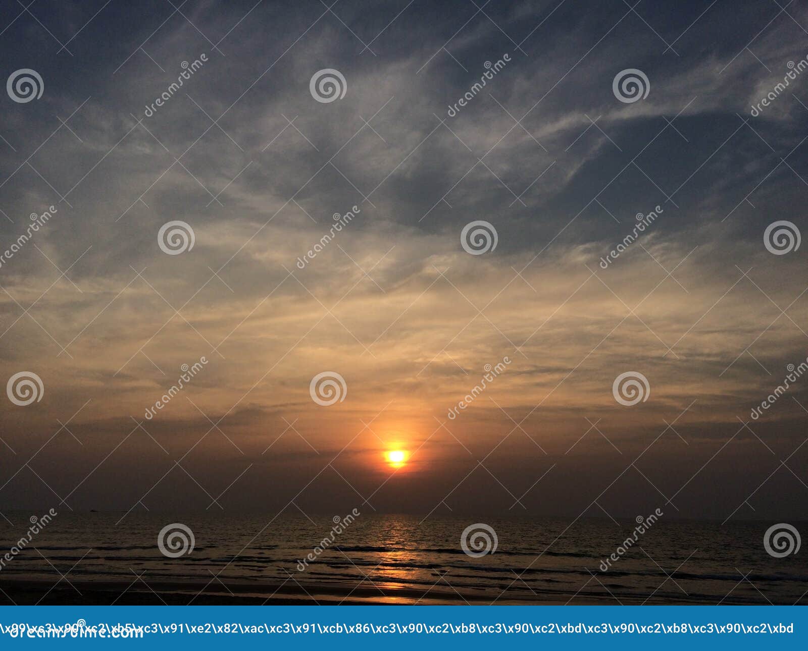 Sunset Over the Ocean. Sand Beach is Painted in Bright Colors in the ...