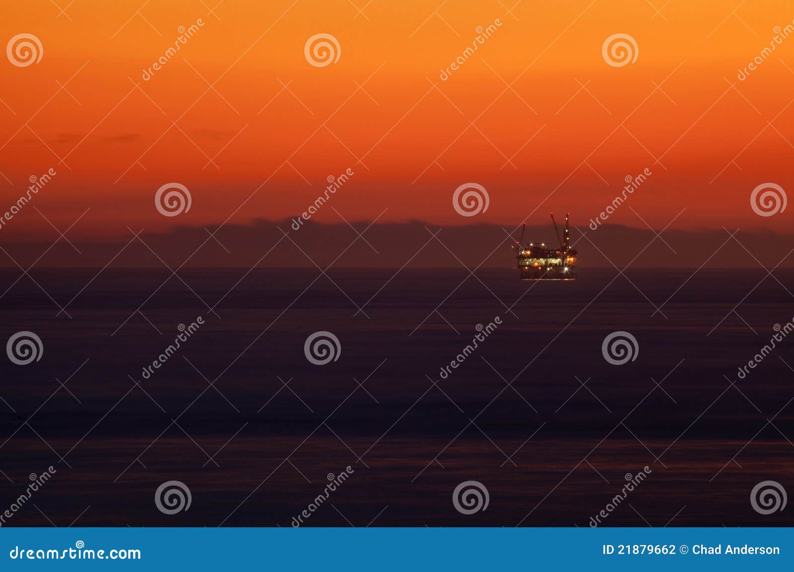 Sunset over oil rig in sea stock photo. Image of power - 21879662