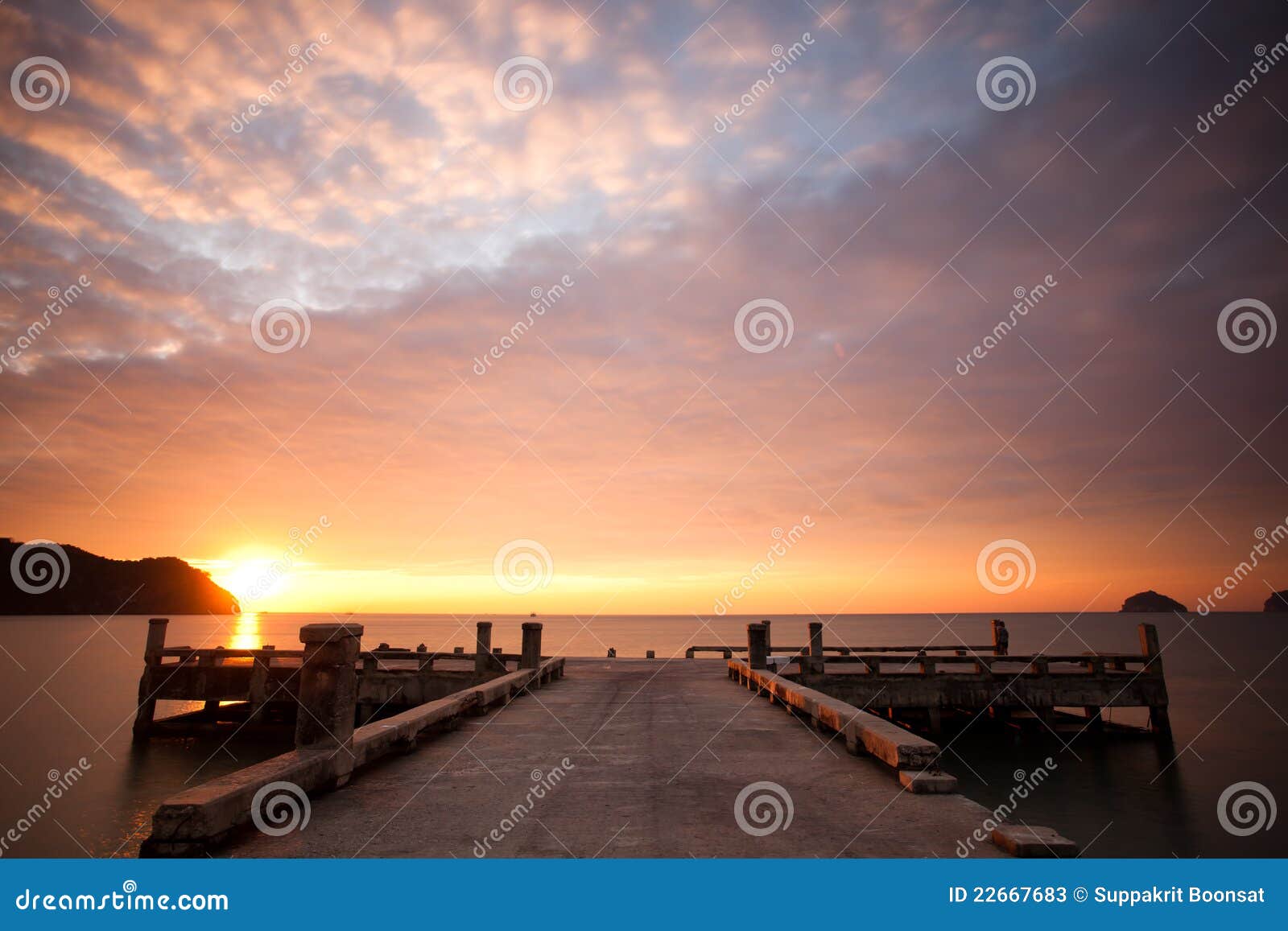 Sunset over pier and sea stock image. Image of twilight - 22667683
