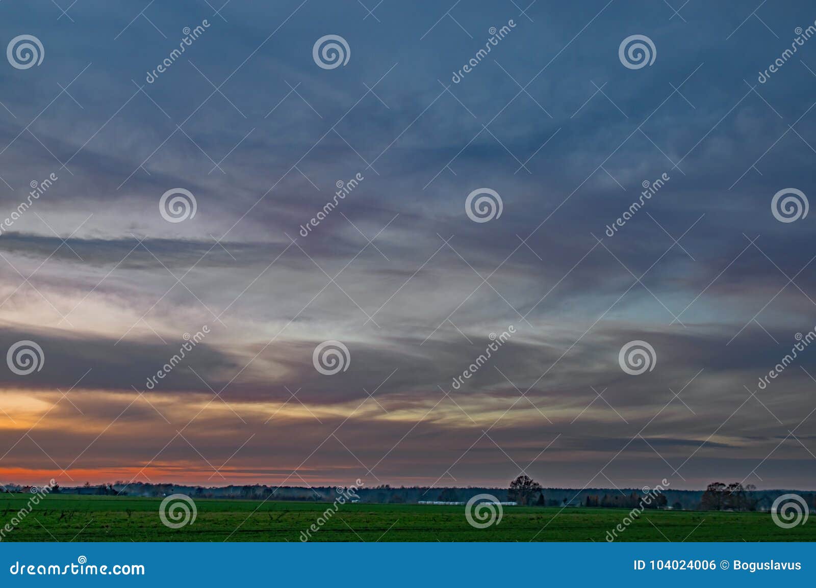 Sunset over the plain. stock photo. Image of green, cereals - 104024006