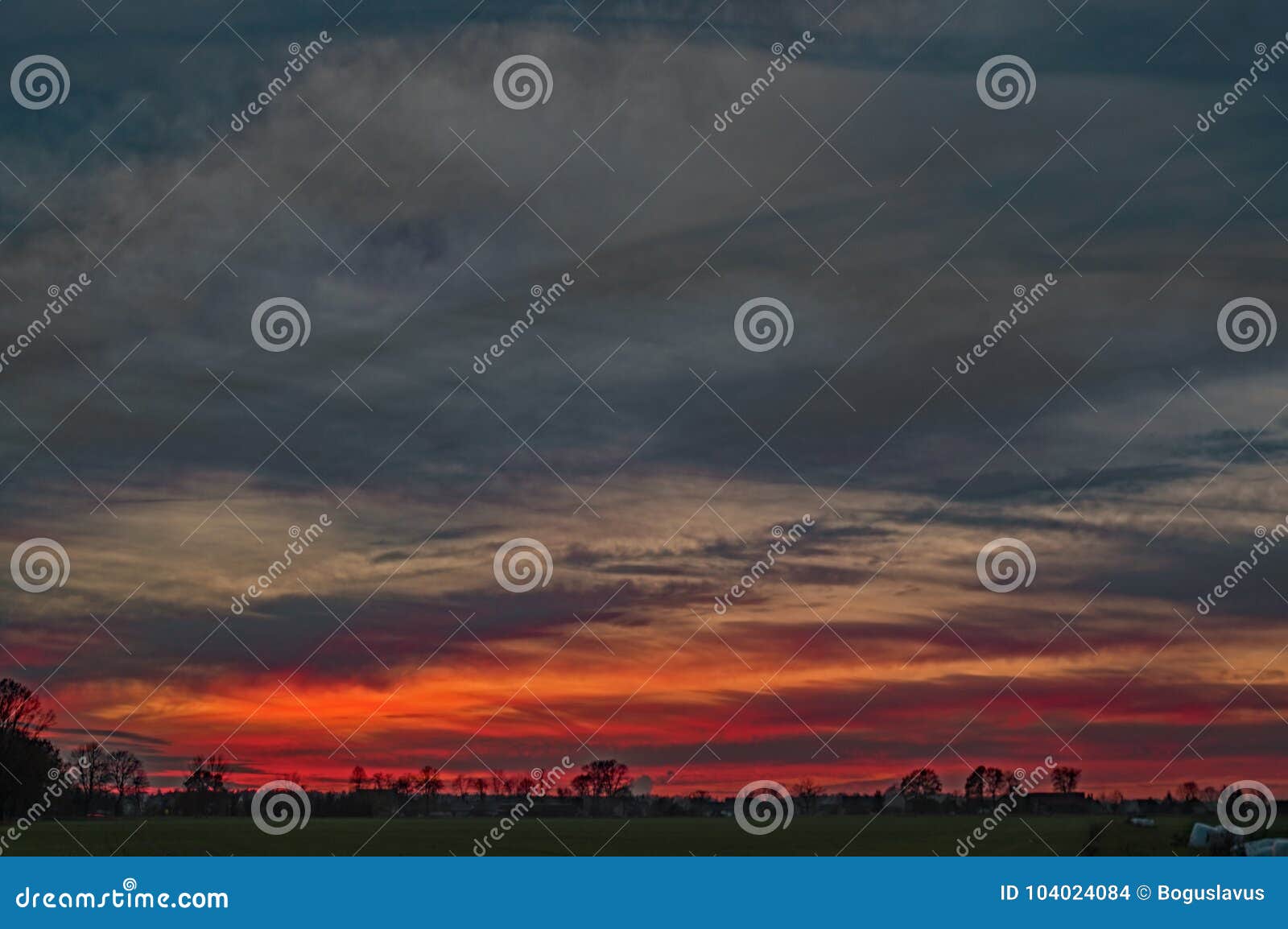 Sunset over the plain. stock photo. Image of land, young - 104024084