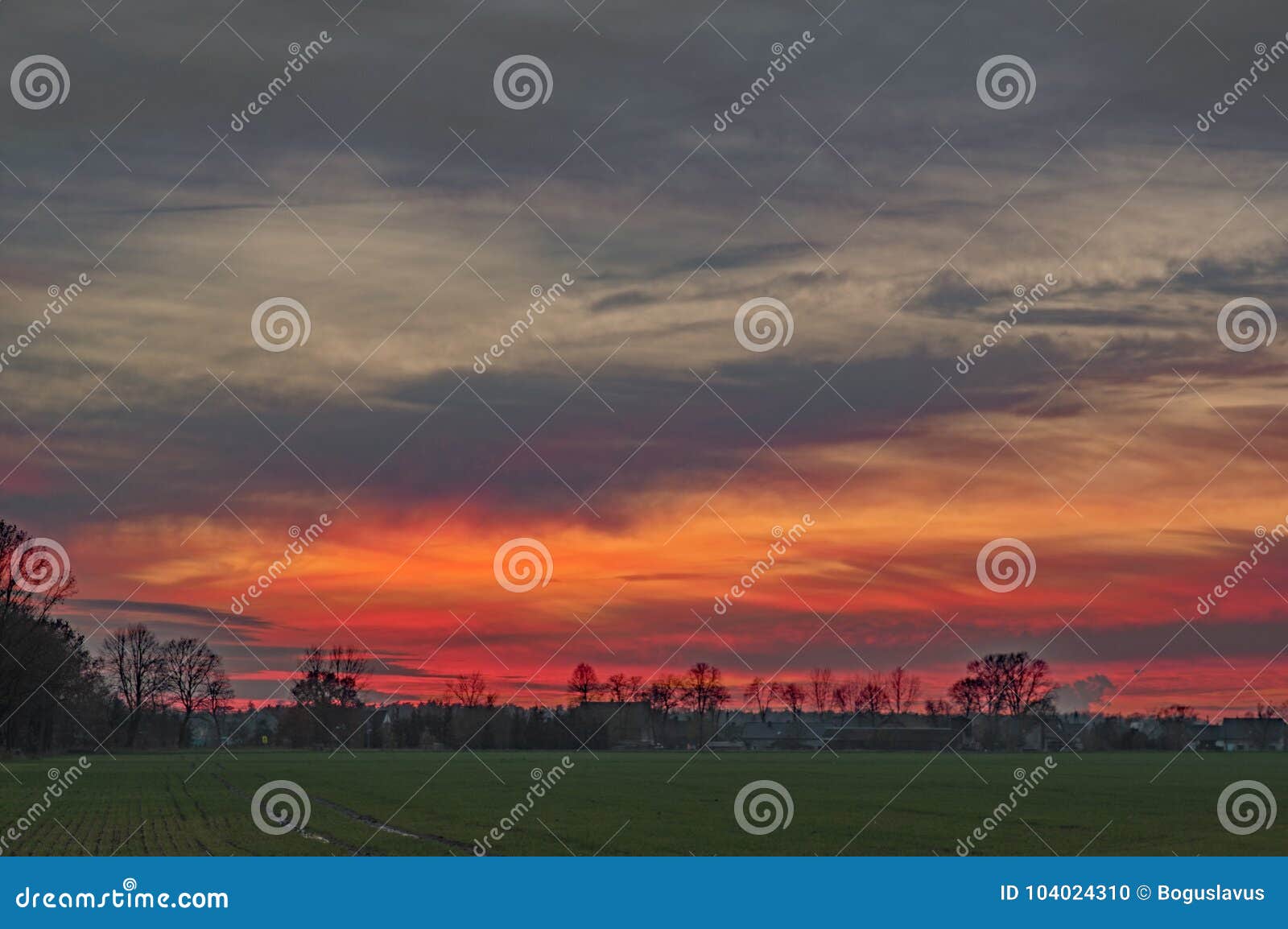 Sunset over the plain. stock photo. Image of arable - 104024310