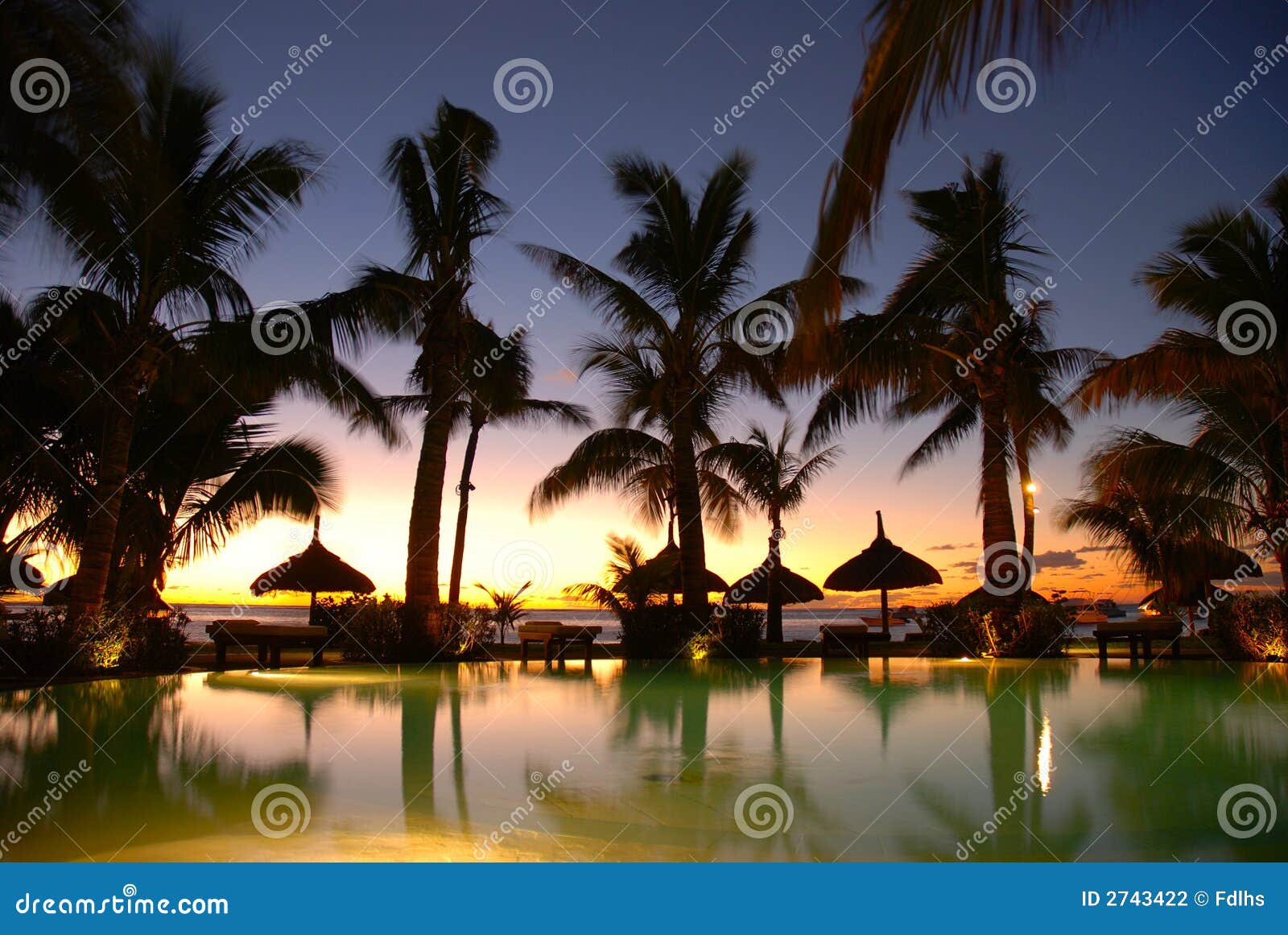 Sunset over pool at resort stock photo. Image of colors - 2743422