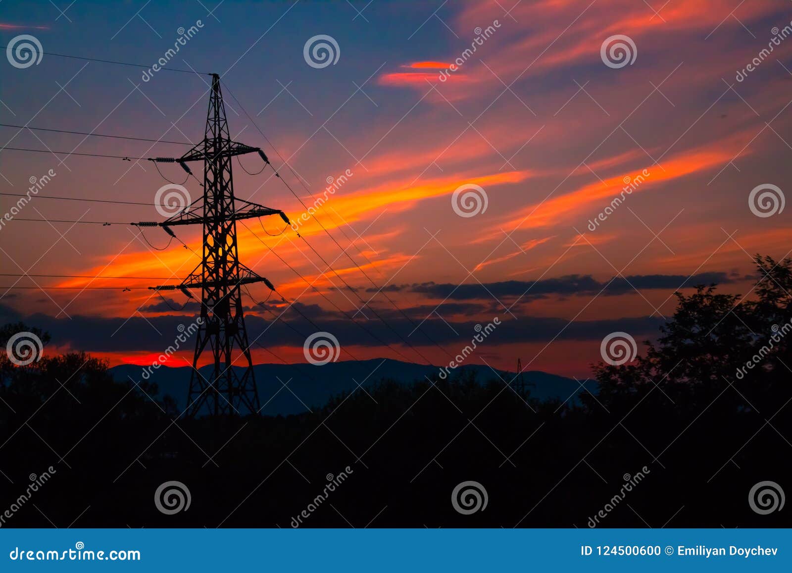 Sunset over the power pole stock photo. Image of forest - 124500600