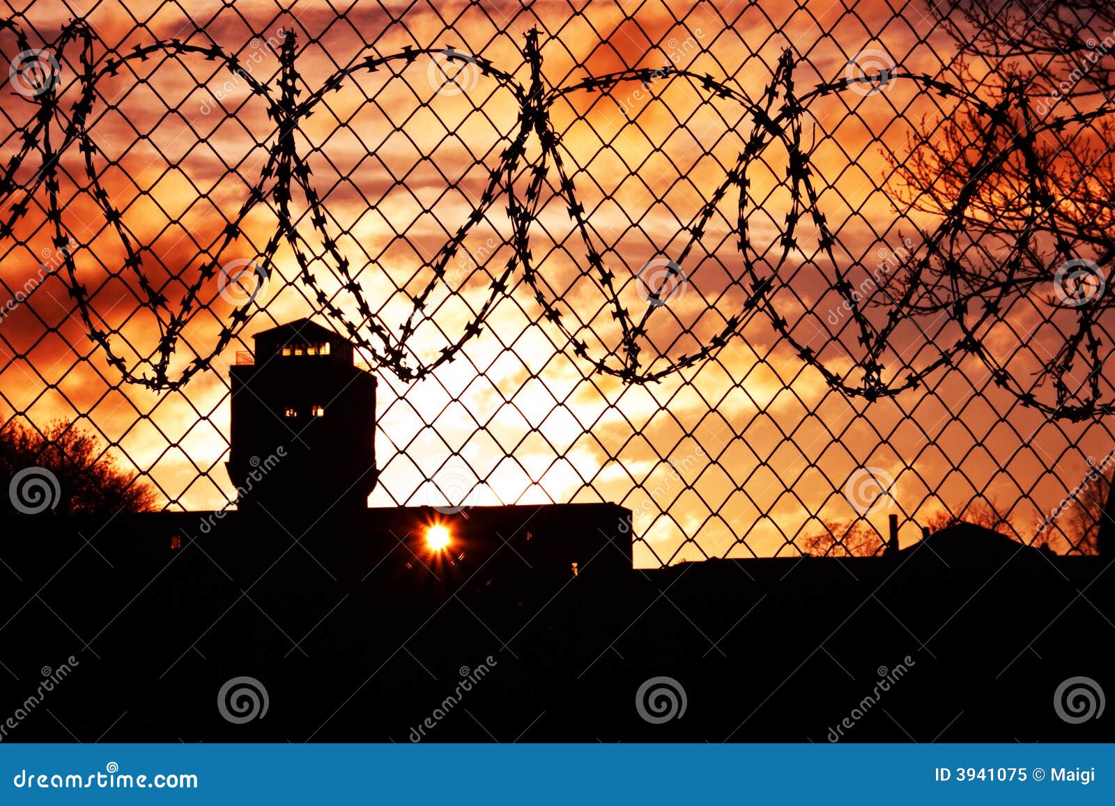 Sunset over prison yard stock image. Image of evening - 3941075