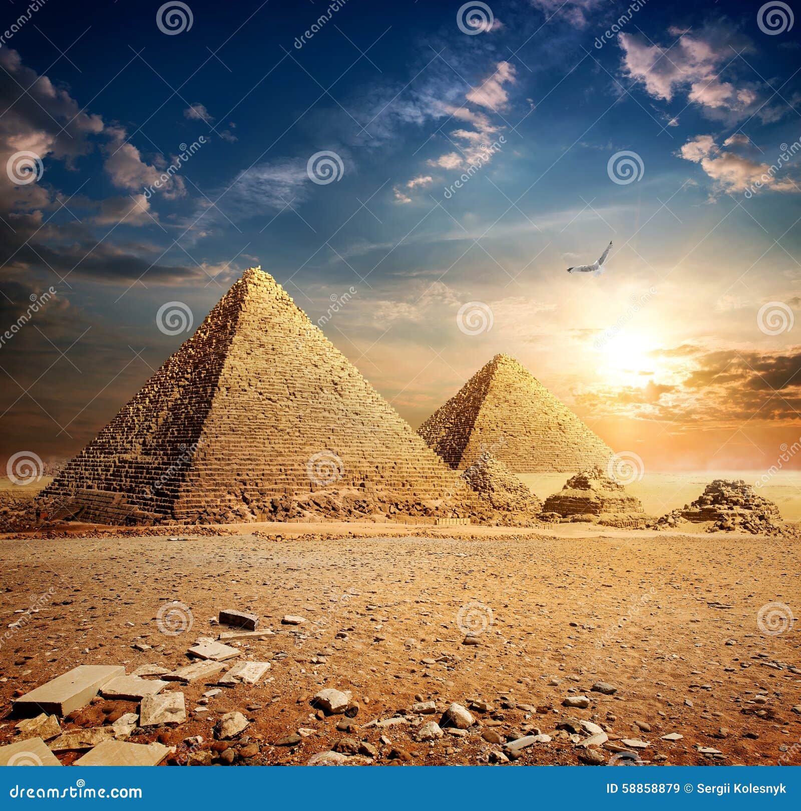 Sunset over pyramids stock image. Image of desert, archaeology - 58858879