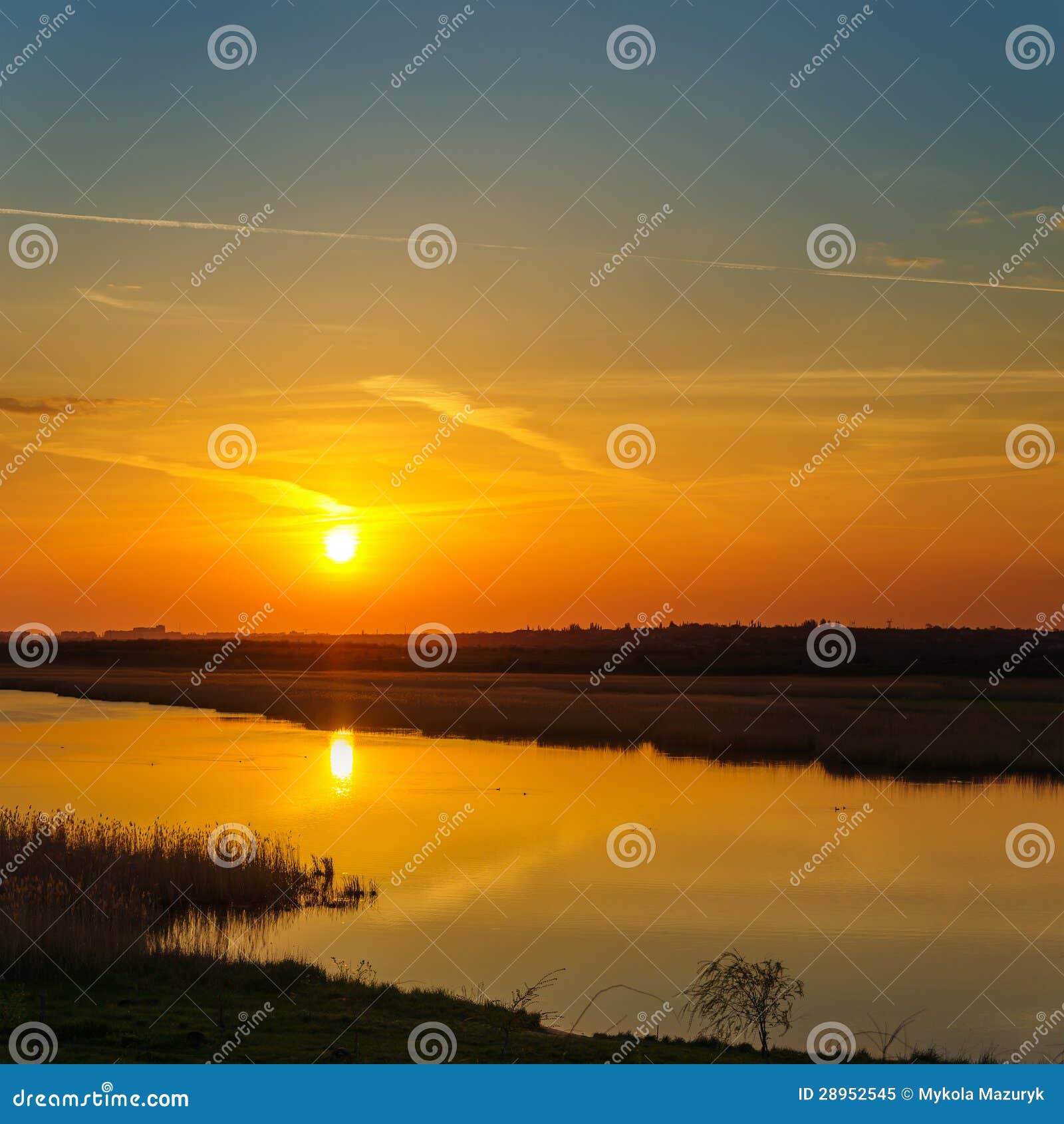 Sunset over river stock image. Image of light, shine - 28952545