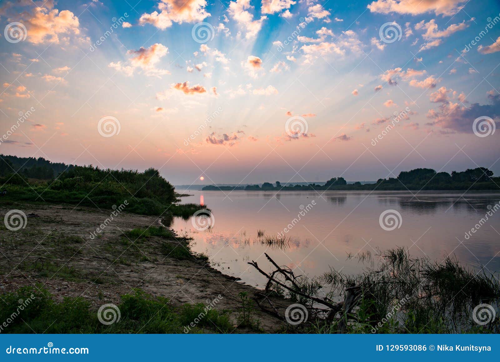 Sunset over the river stock photo. Image of beauty, outdoor - 129593086